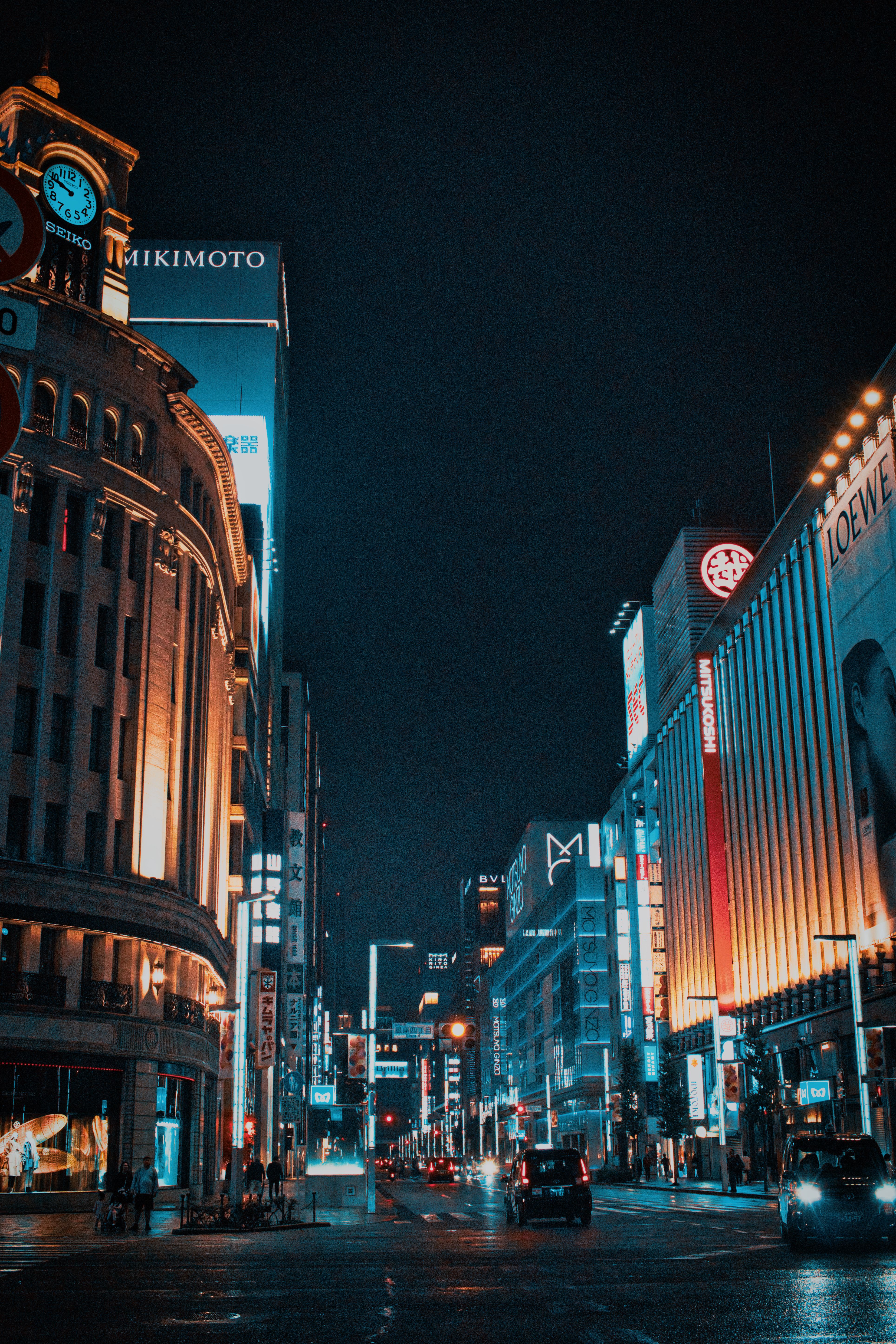 Nighttime in Ginza, Tokyo's Vibrant Street Scene · Free Stock Photo