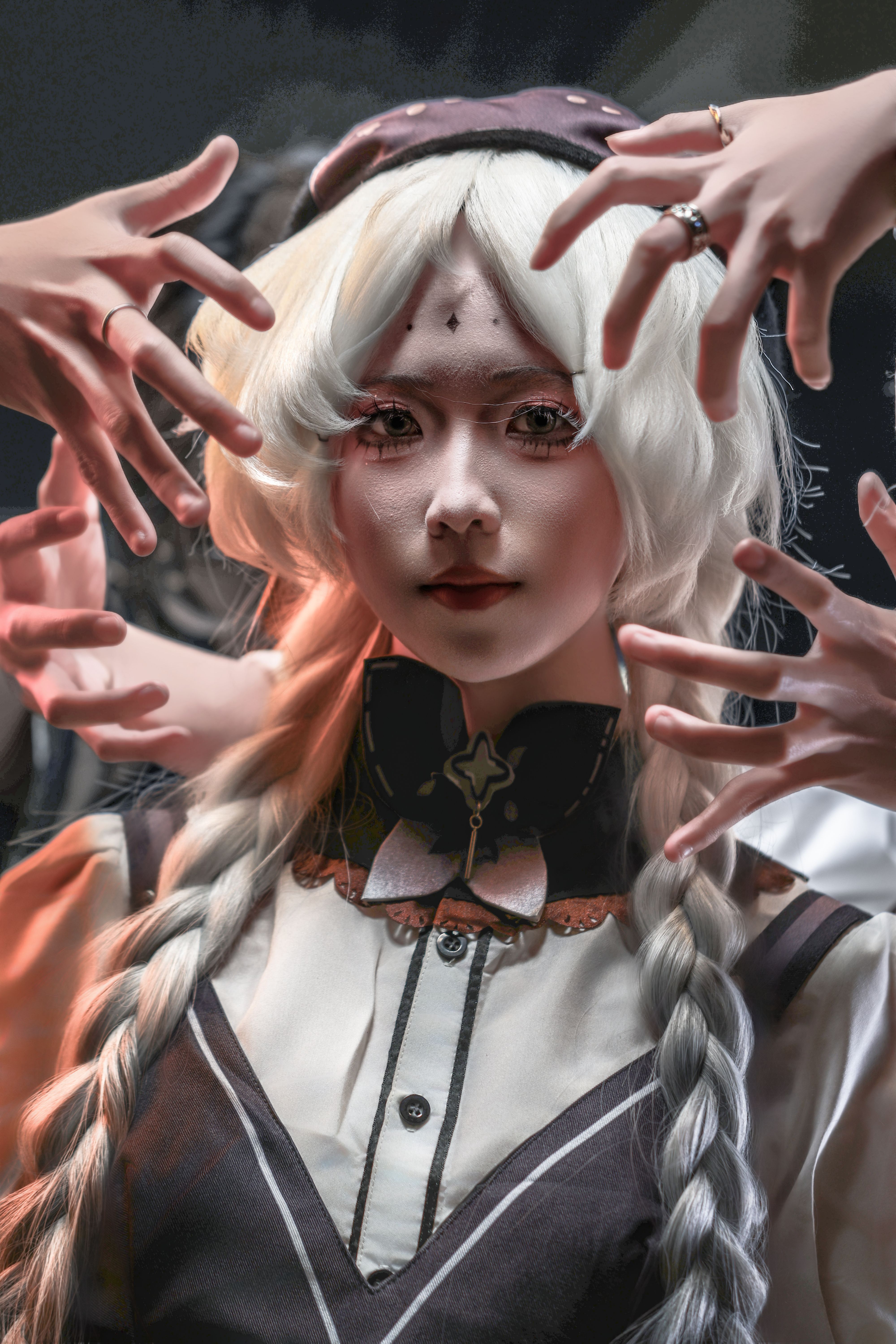 Creative Portrait of Cosplay Character with Hands · Free Stock Photo