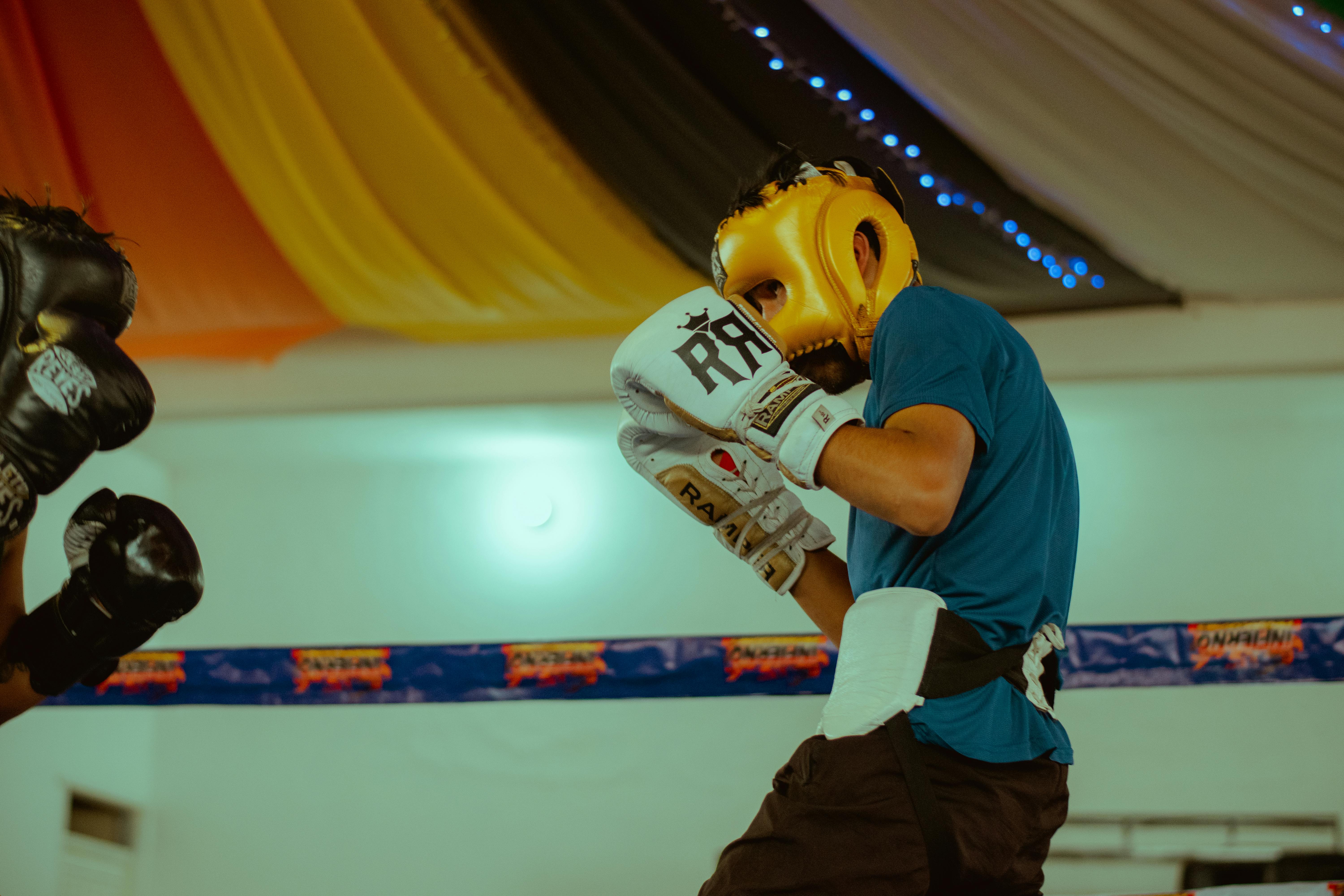 Intense Boxing Match with Focused Fighters · Free Stock Photo