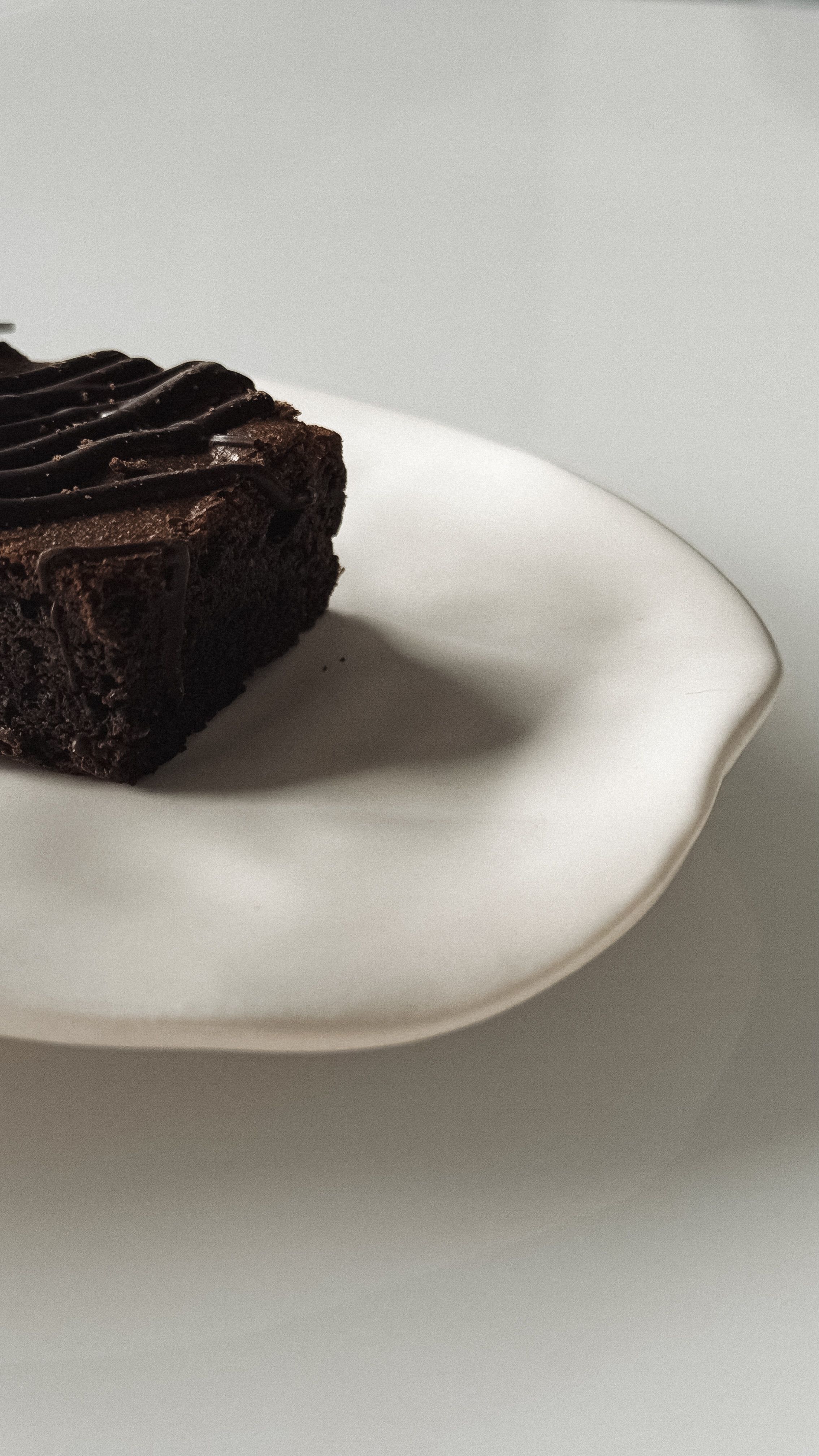 Photo Of Sliced Cake On Ceramic Plate · Free Stock Photo