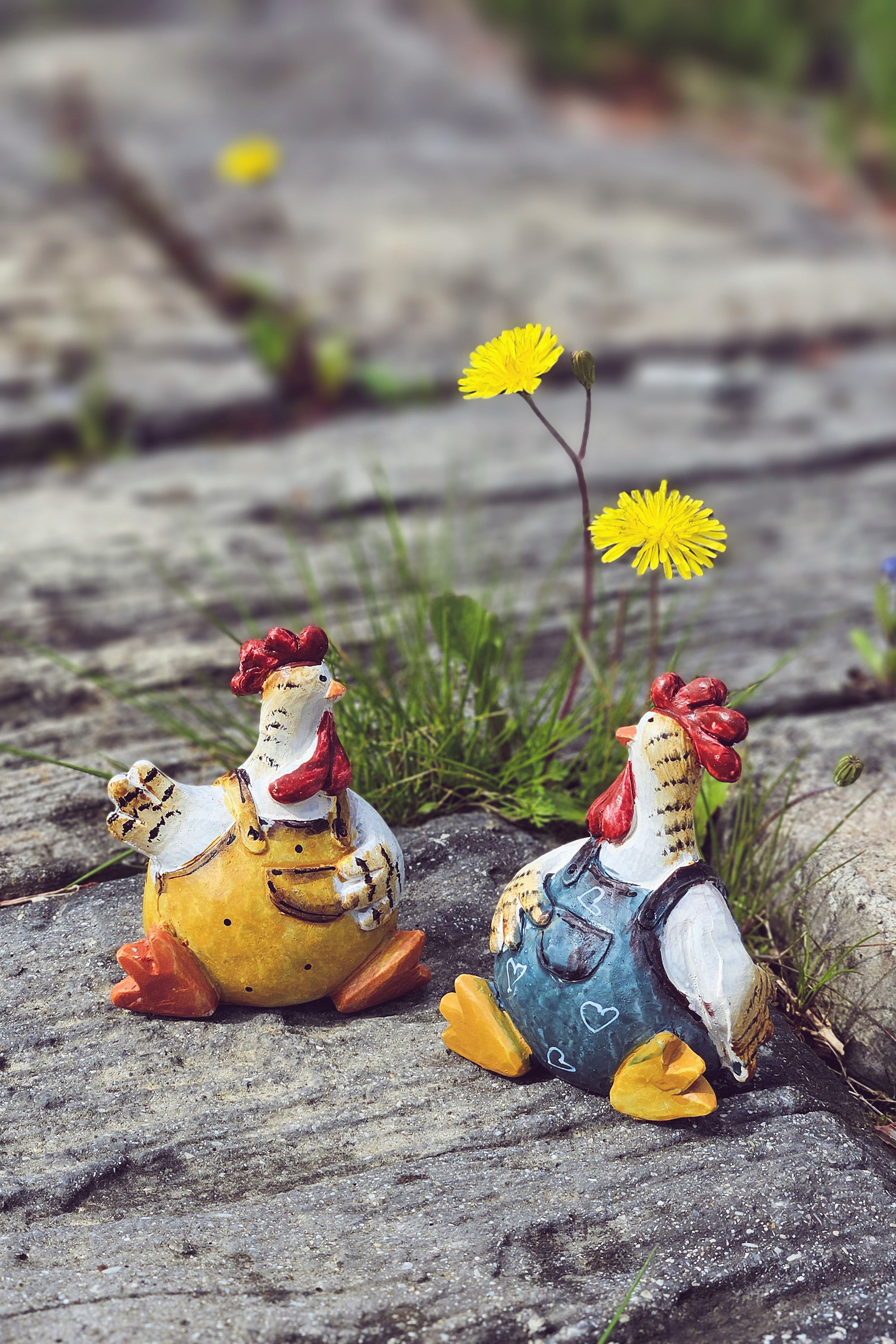 Rustic Easter Chicken Figures on Stone Path · Free Stock Photo