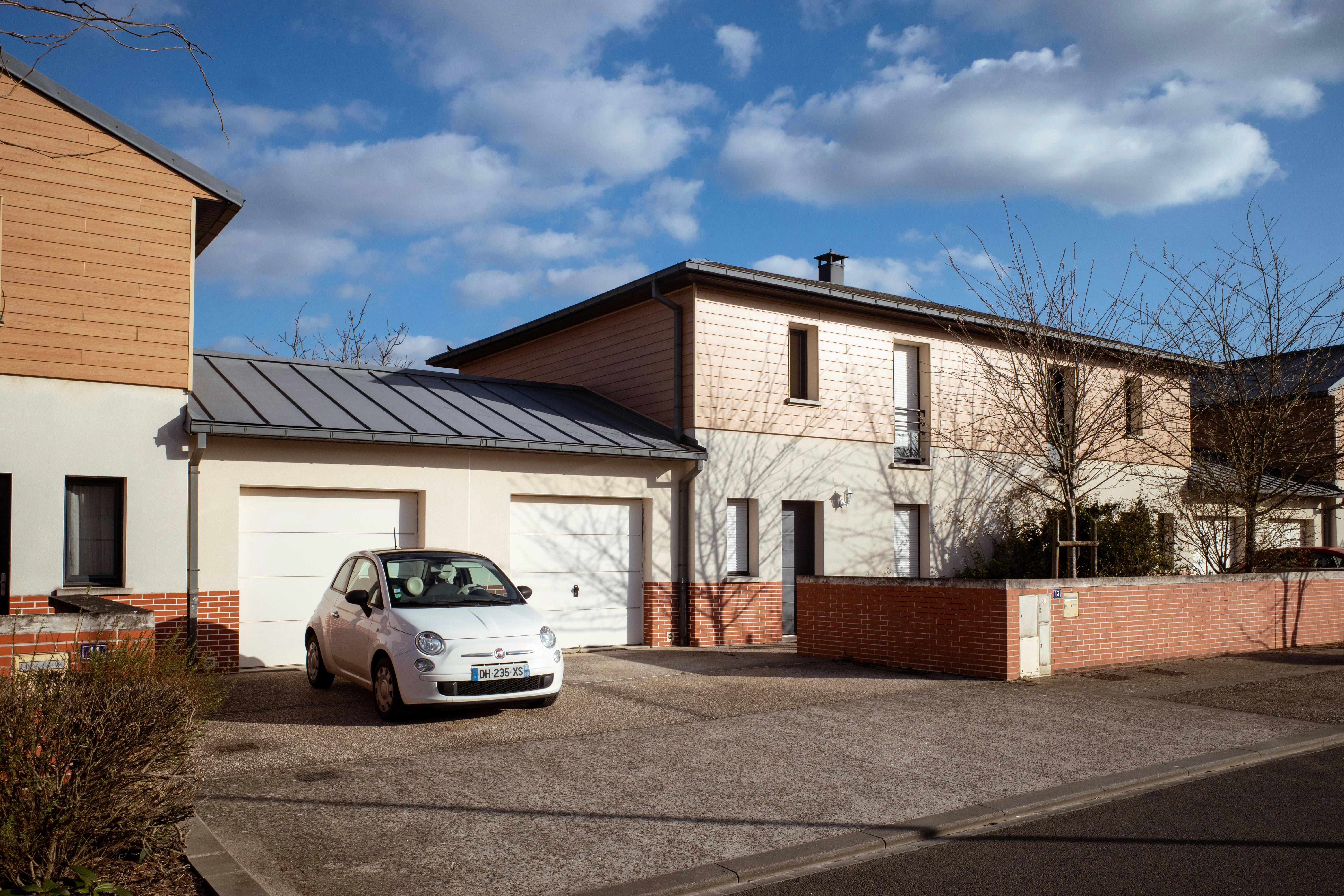 Suburban House with Car in Compiègne, France · Free Stock Photo