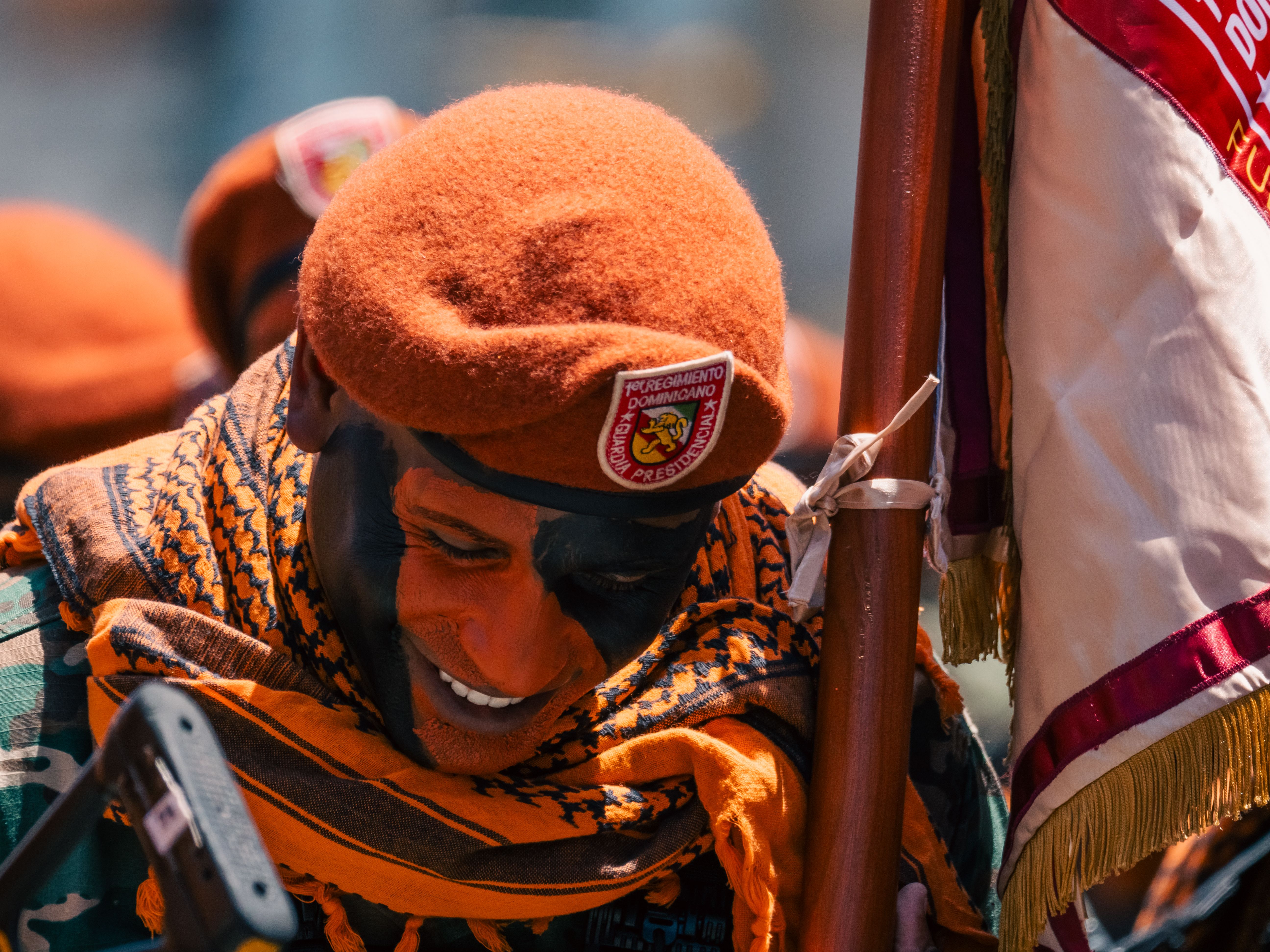 Colorful Military Parade Participant in Beret · Free Stock Photo