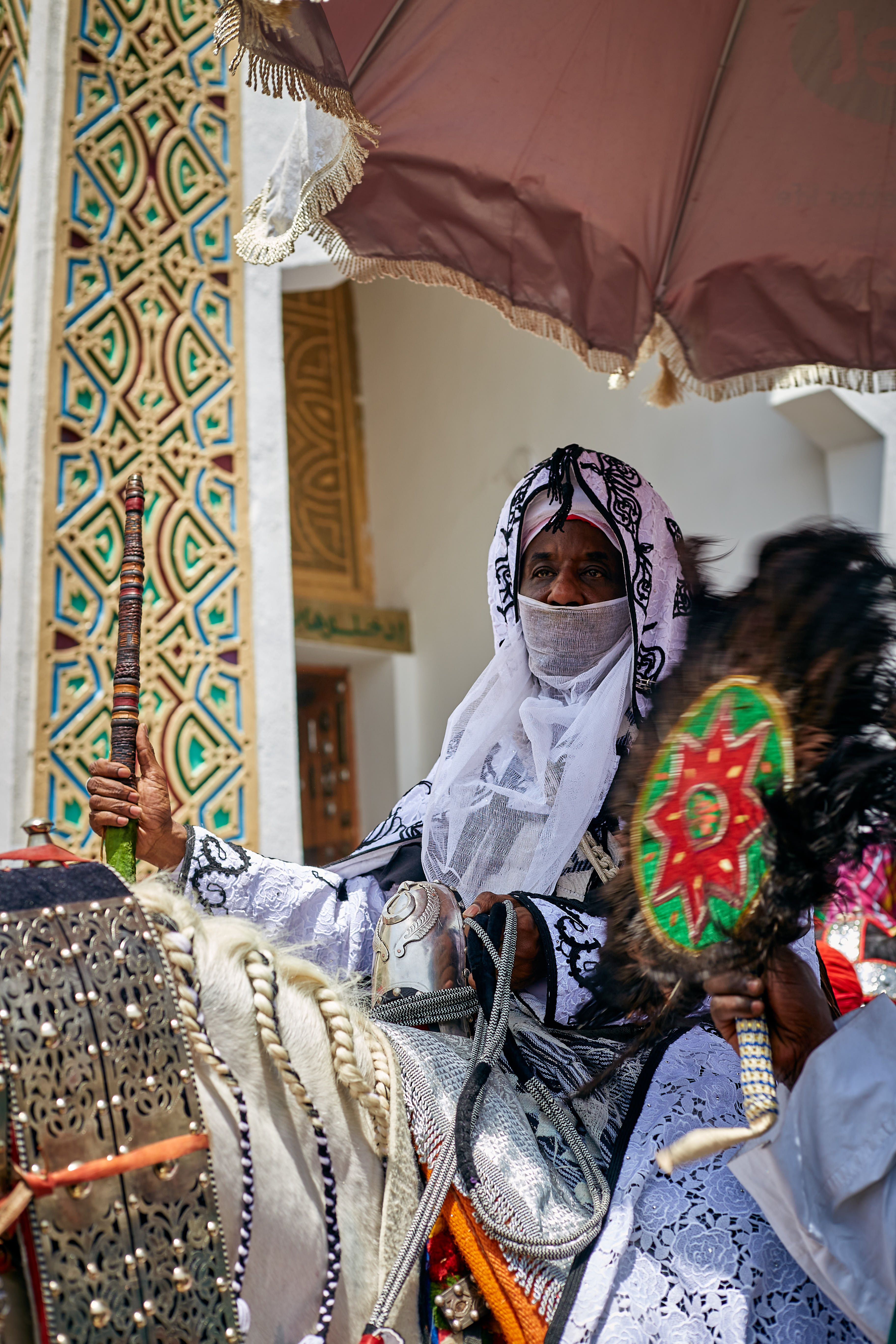 Traditional African Warrior in Ornate Attire · Free Stock Photo