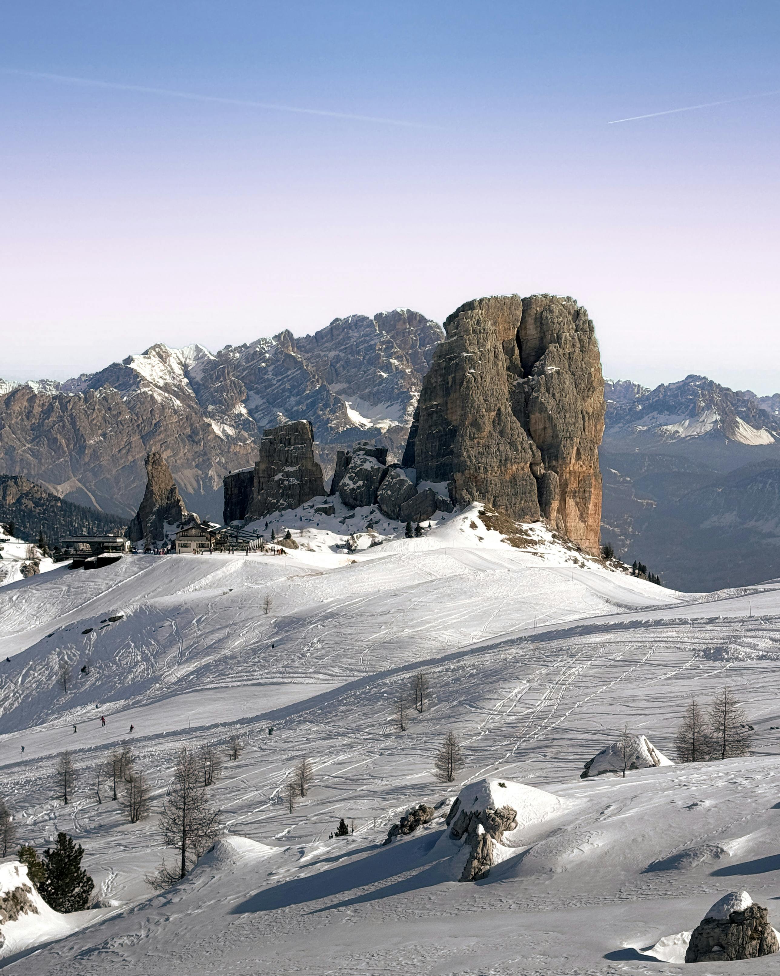 Snowy Alpine Landscape with Dramatic Rock Formations · Free Stock Photo