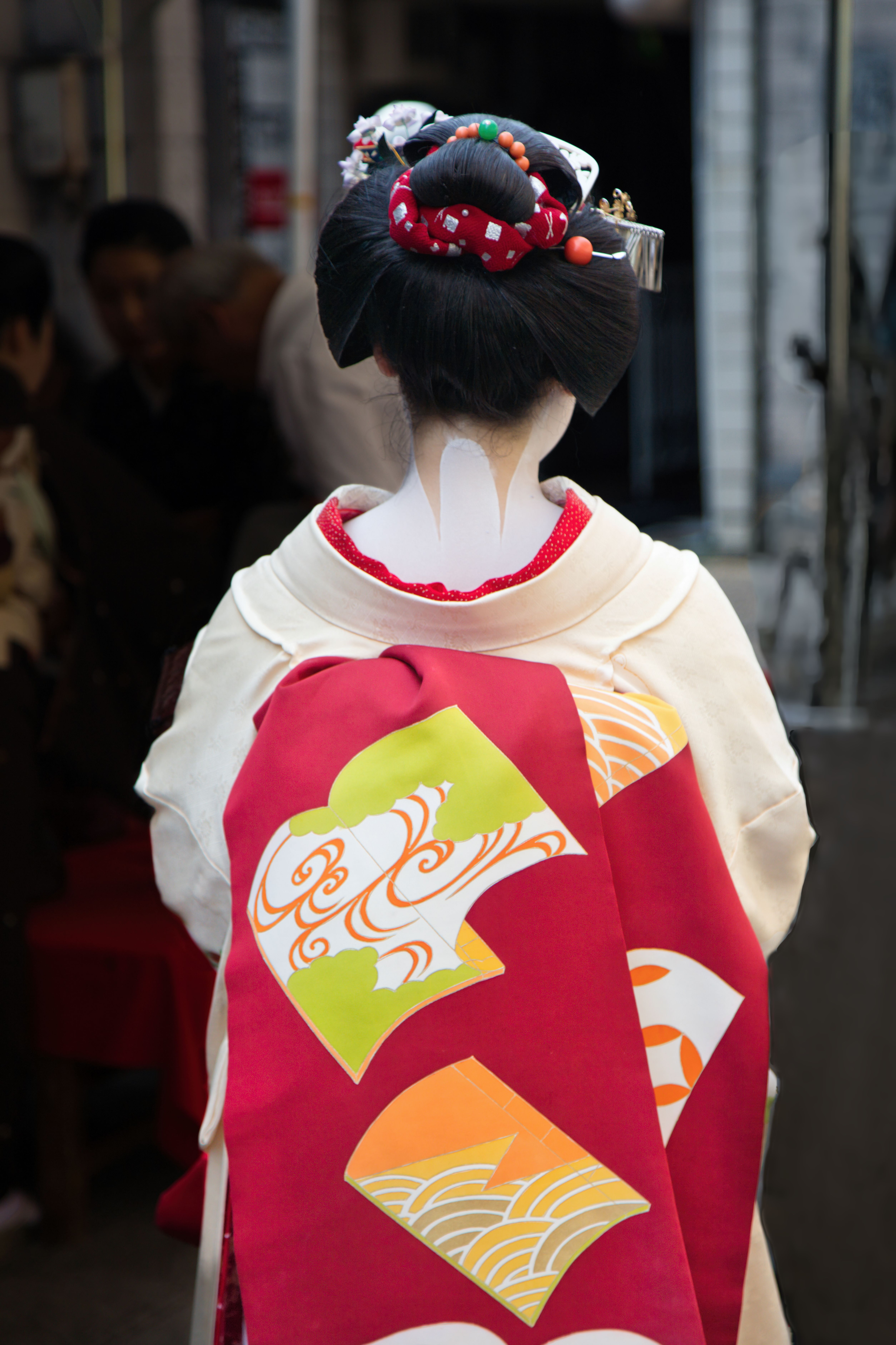 Traditional Japanese Geisha in Vibrant Kimono Back View · Free Stock Photo