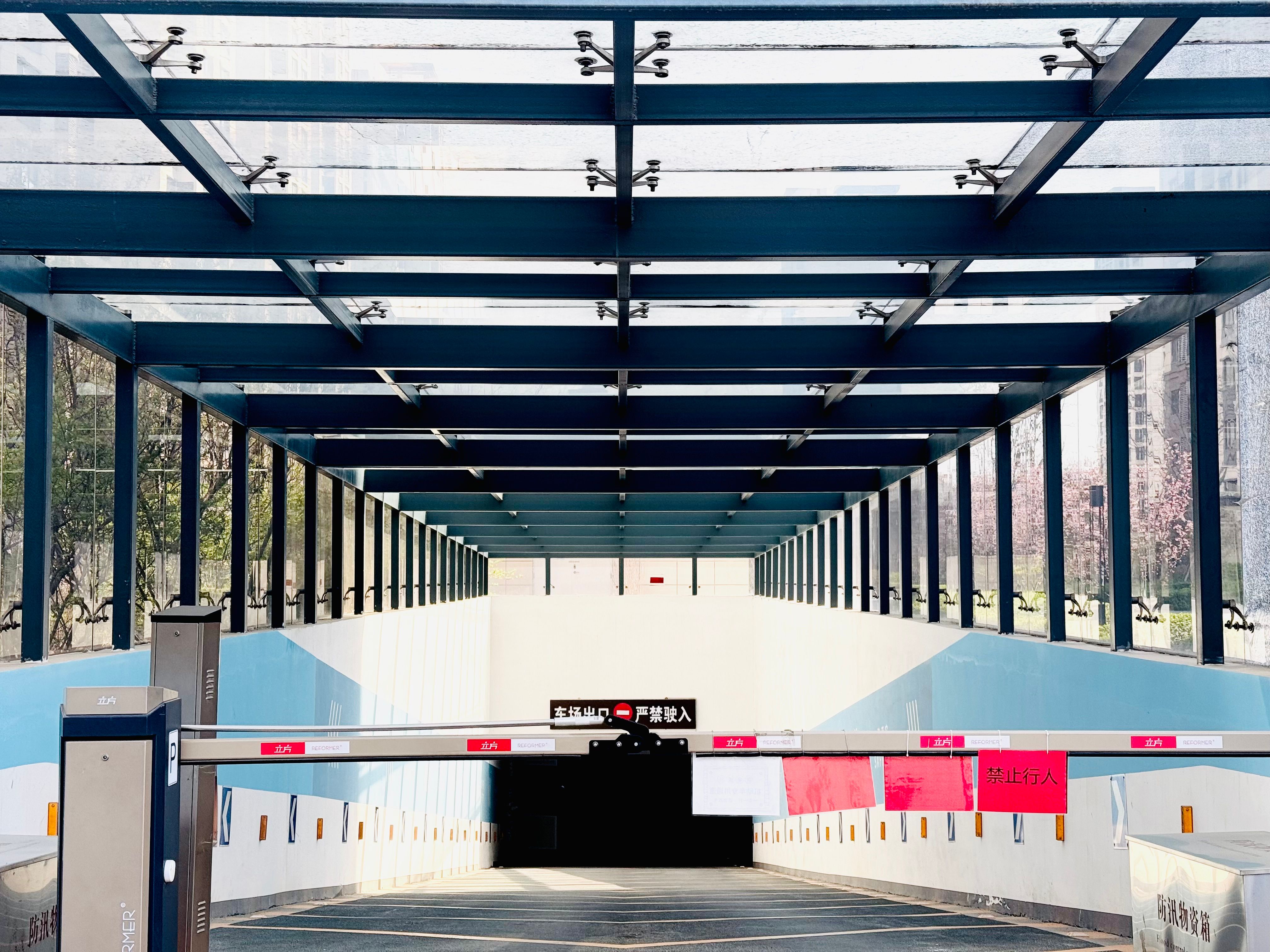 Modern Entrance to Underground Parking Tunnel · Free Stock Photo