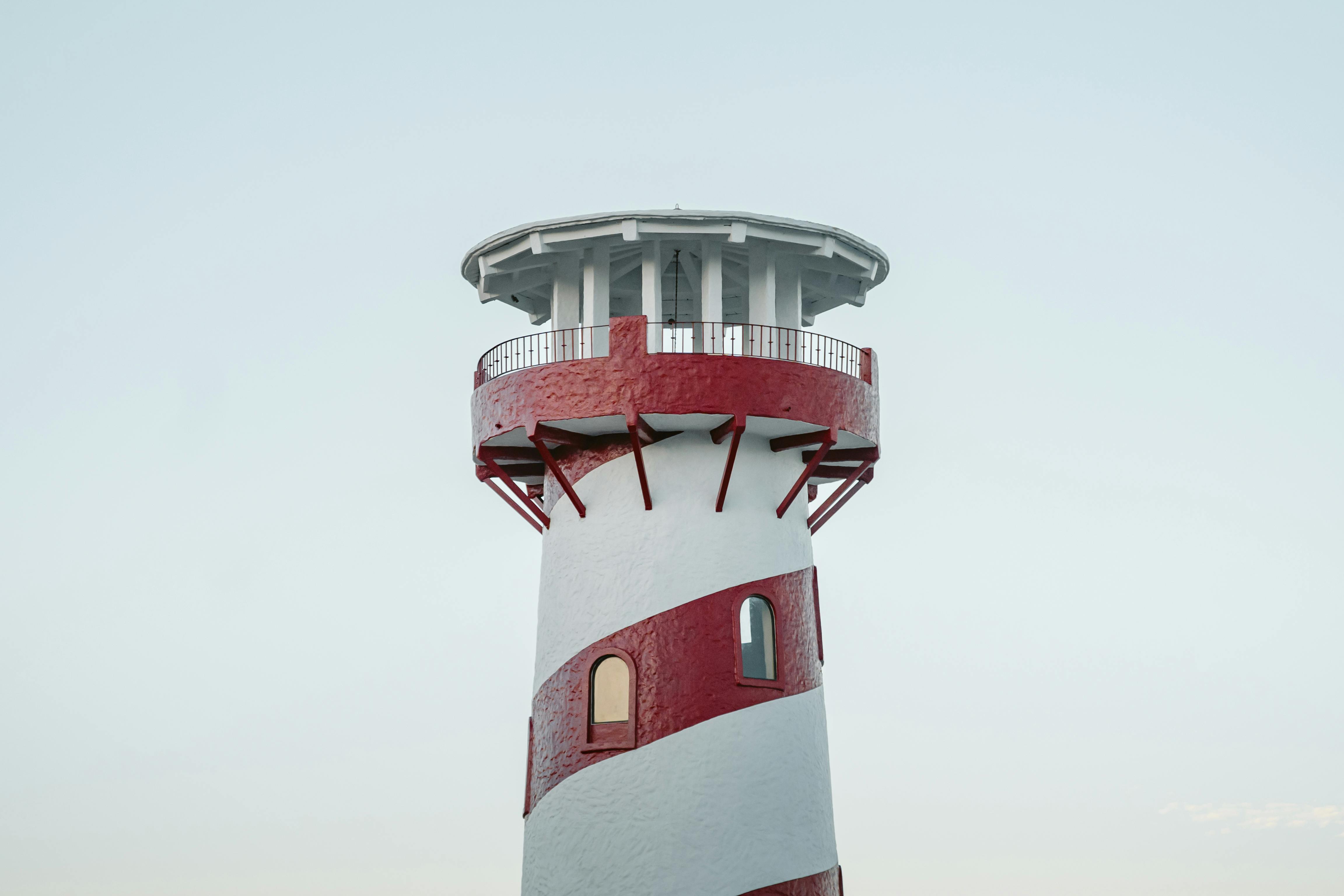 Red and White Spiral Lighthouse in Baja California Sur · Free Stock Photo