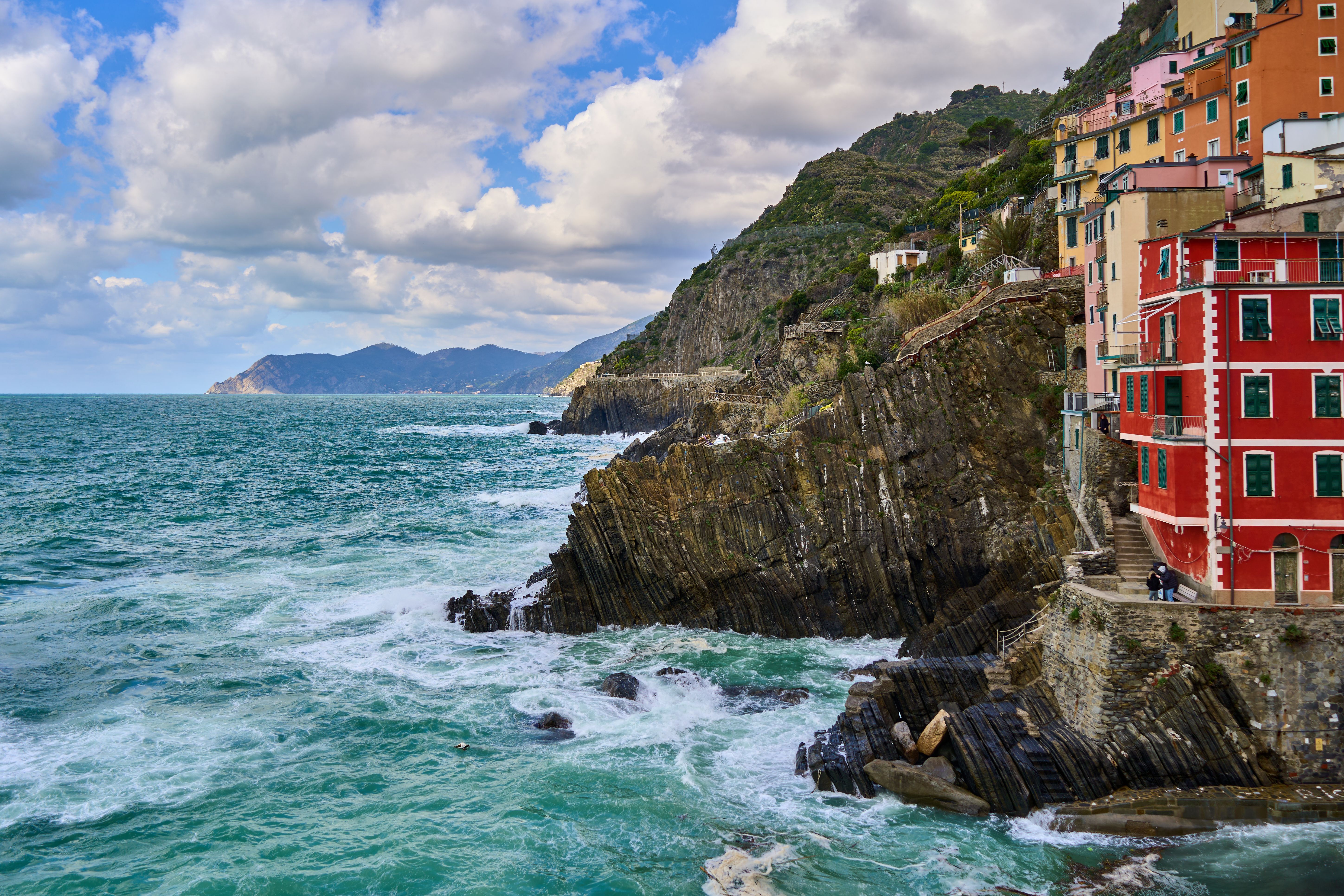 Scenic Coastal View of Colorful Cliffside Village · Free Stock Photo