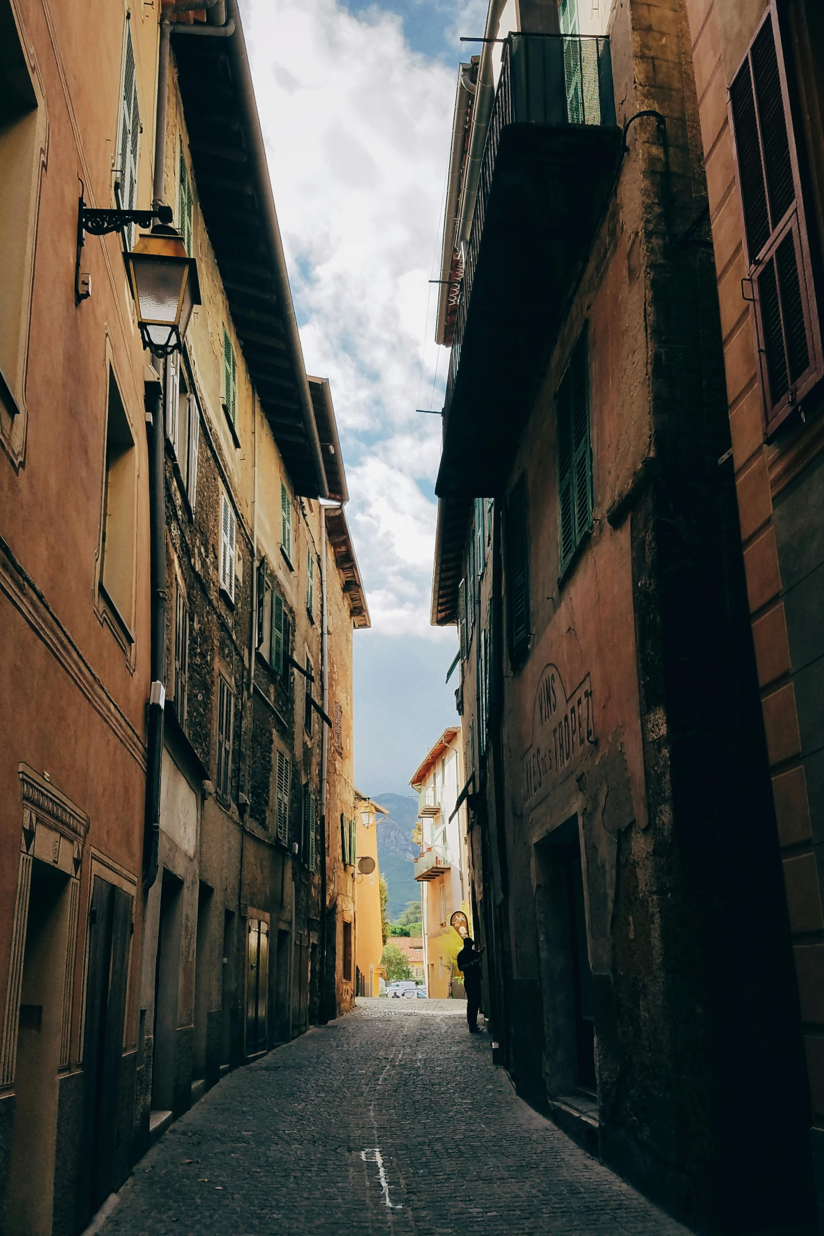 Charming Narrow European Street View · Free Stock Photo