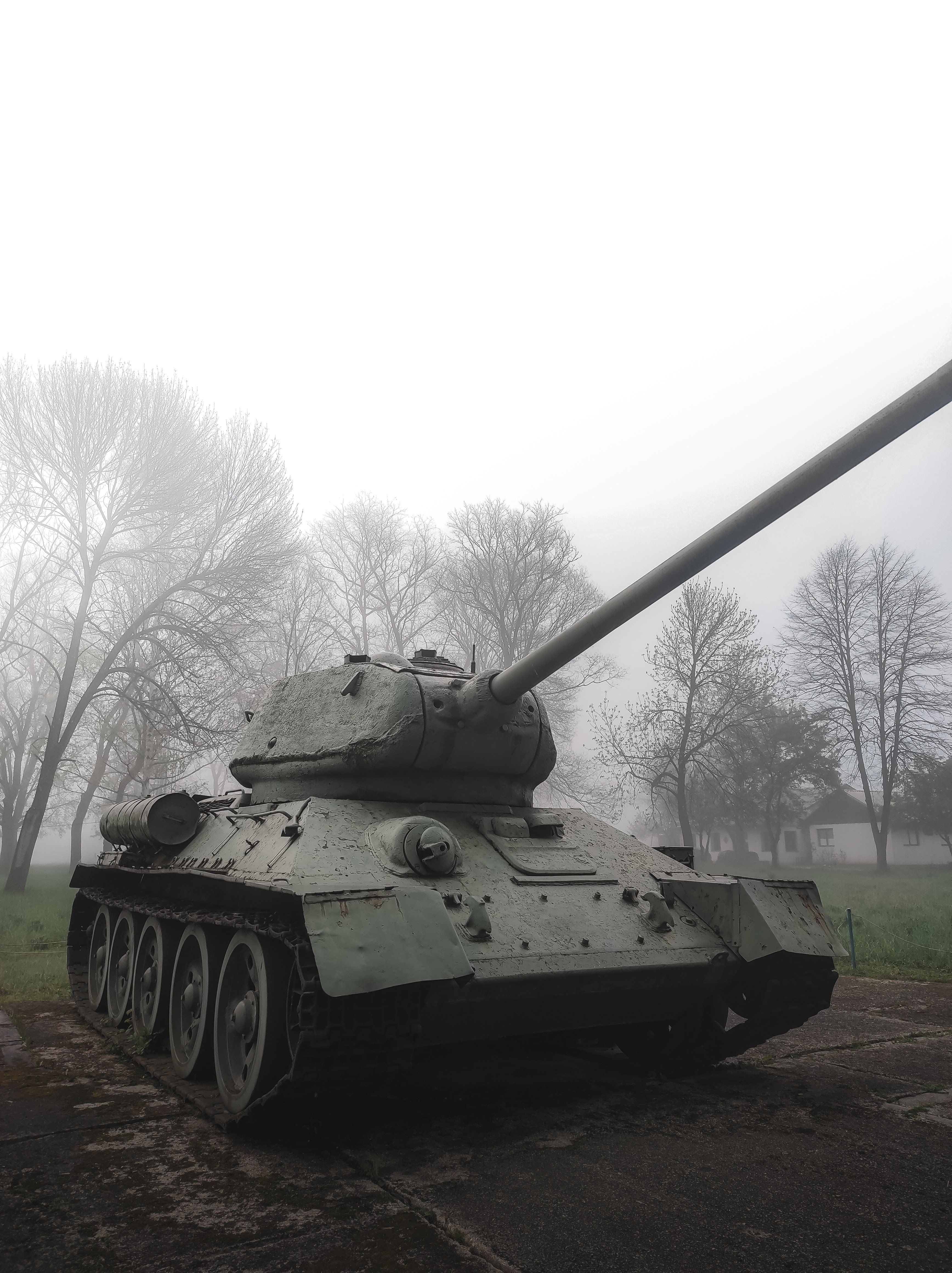 Old Military Tank in Foggy Outdoor Setting · Free Stock Photo