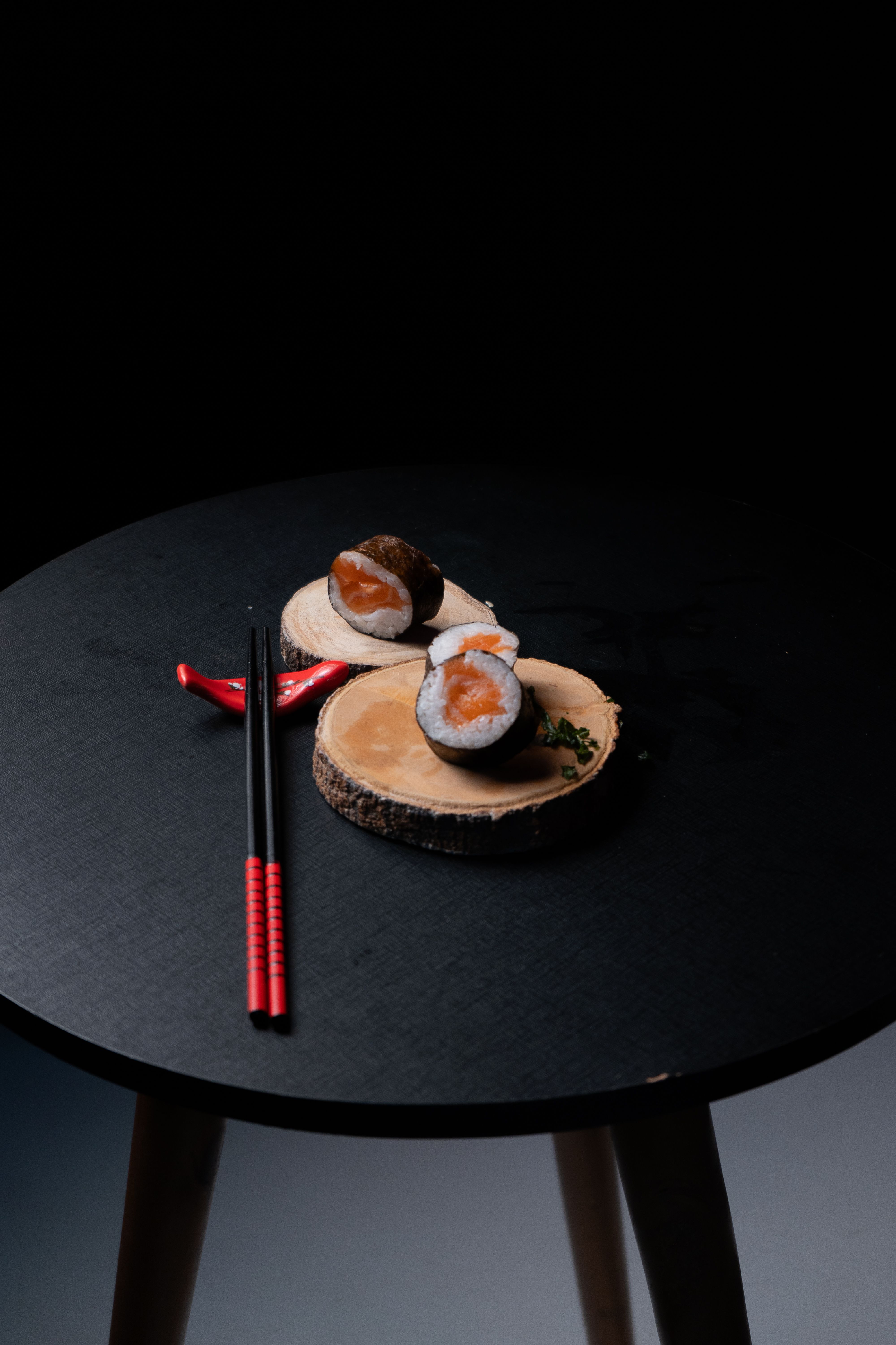 Elegant Sushi Presentation on Black Tabletop · Free Stock Photo