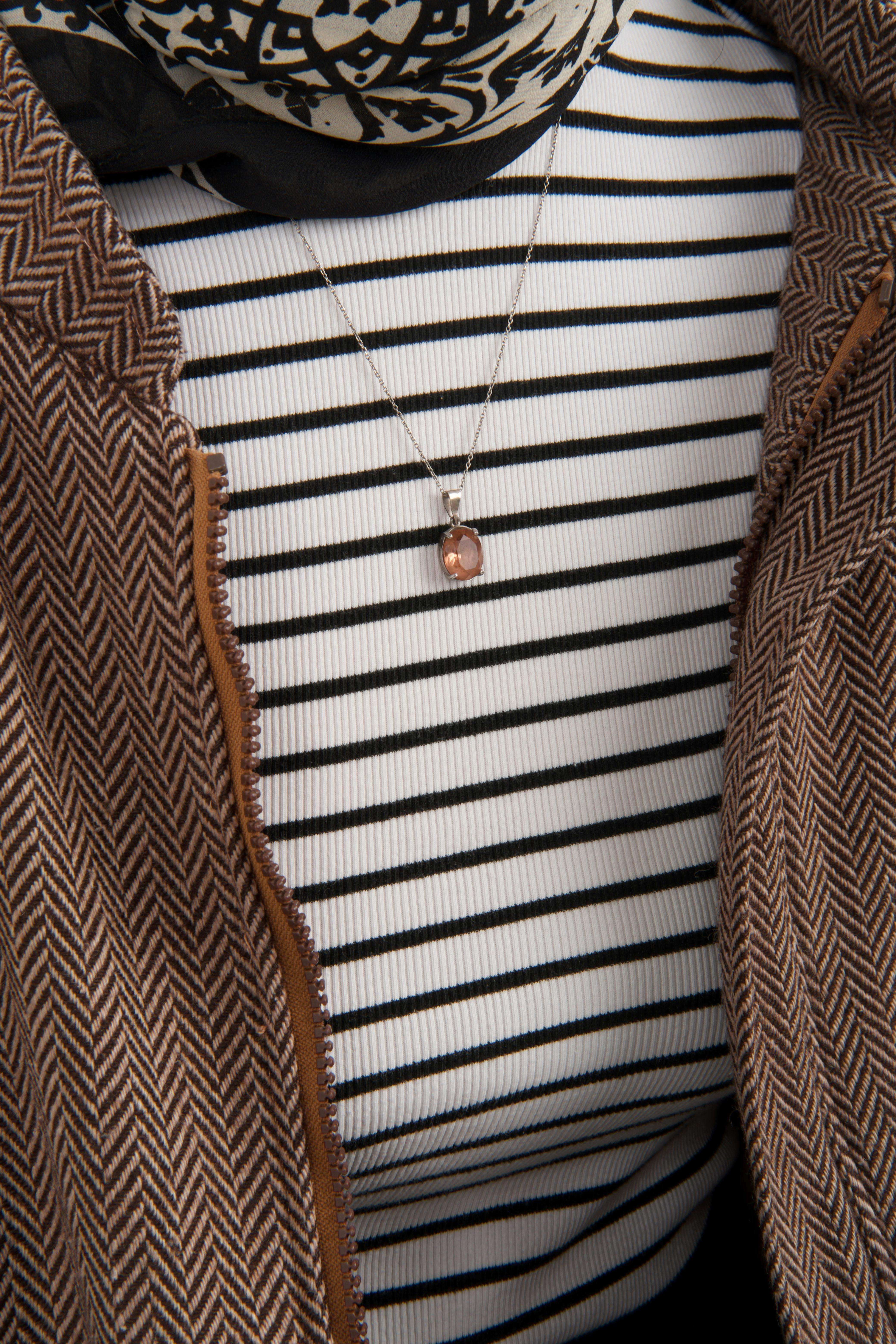 Close-up of Stylish Layered Outfit with Necklace · Free Stock Photo