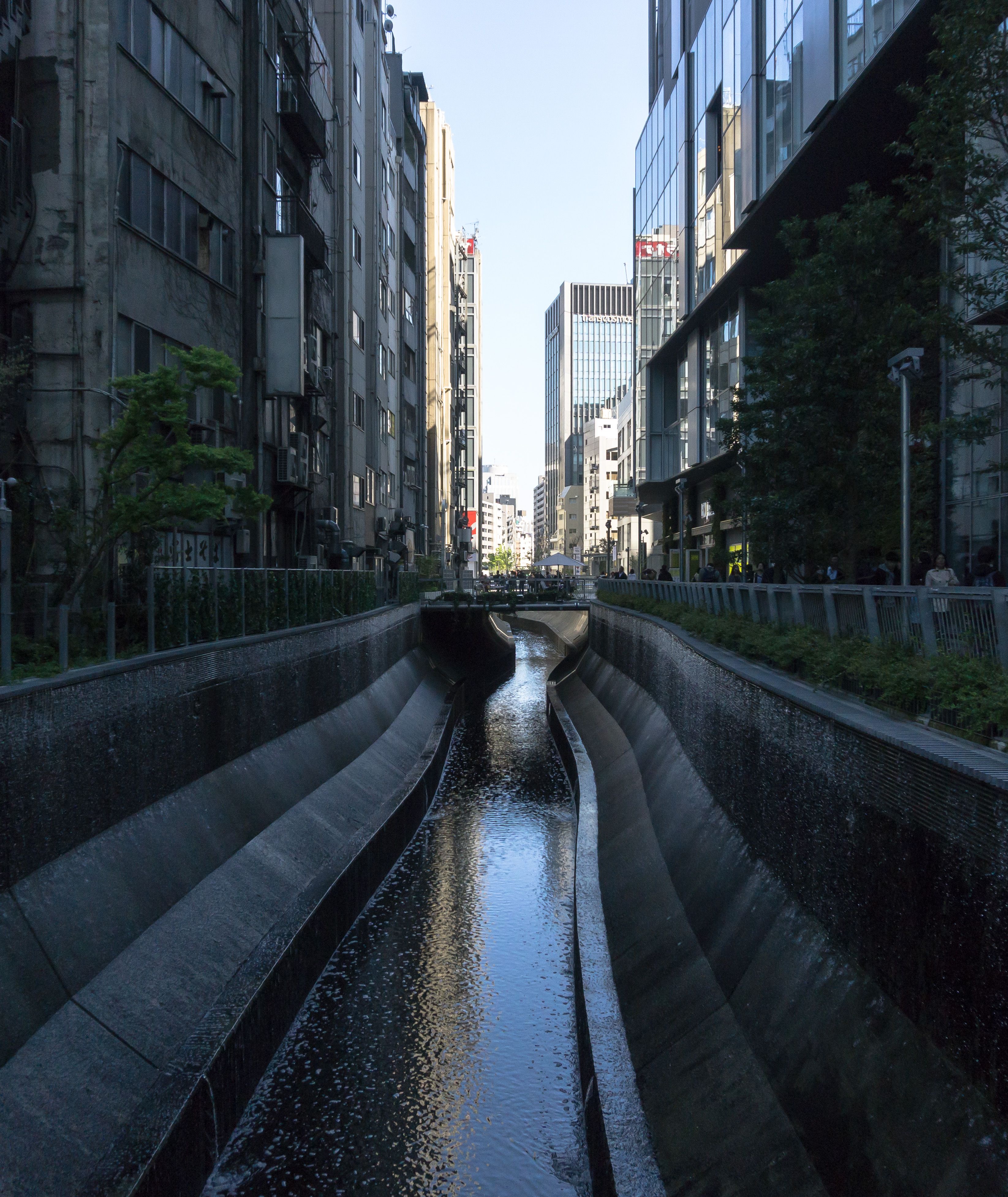 Urban Canal Between Modern Skyscrapers · Free Stock Photo