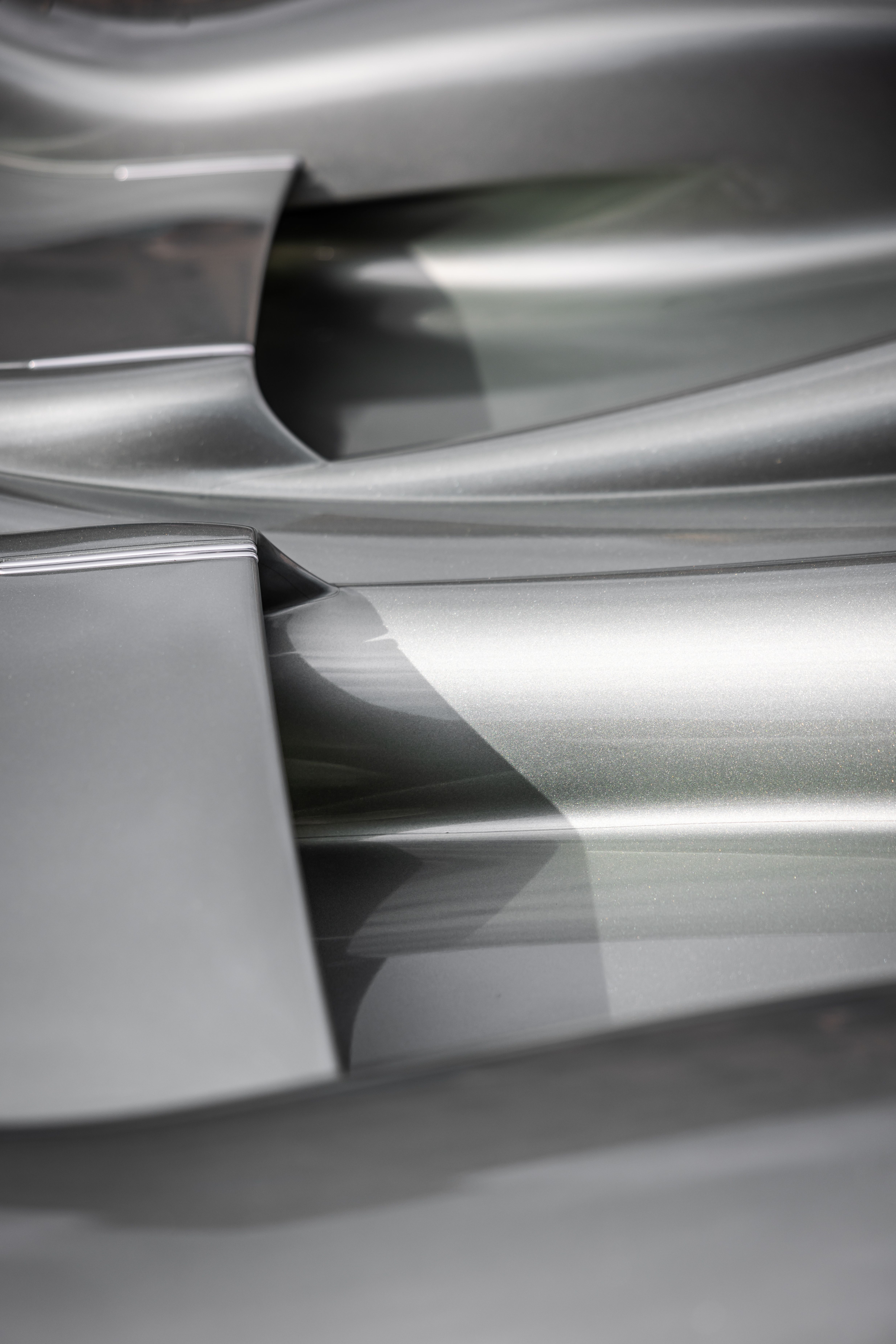 Abstract Close-Up of Metallic Car Curves · Free Stock Photo