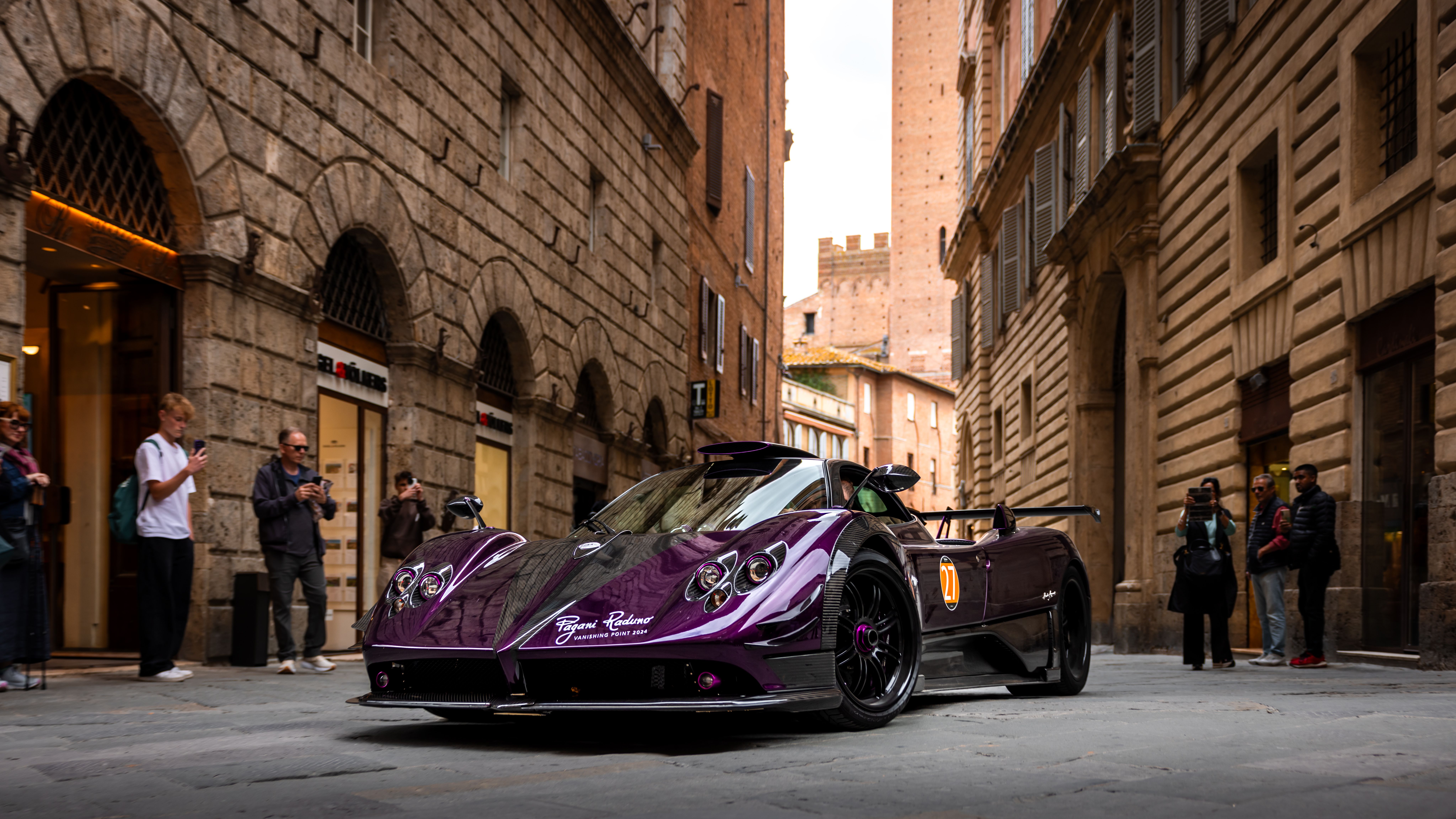 Luxury Sports Car in Historic Italian Street · Free Stock Photo