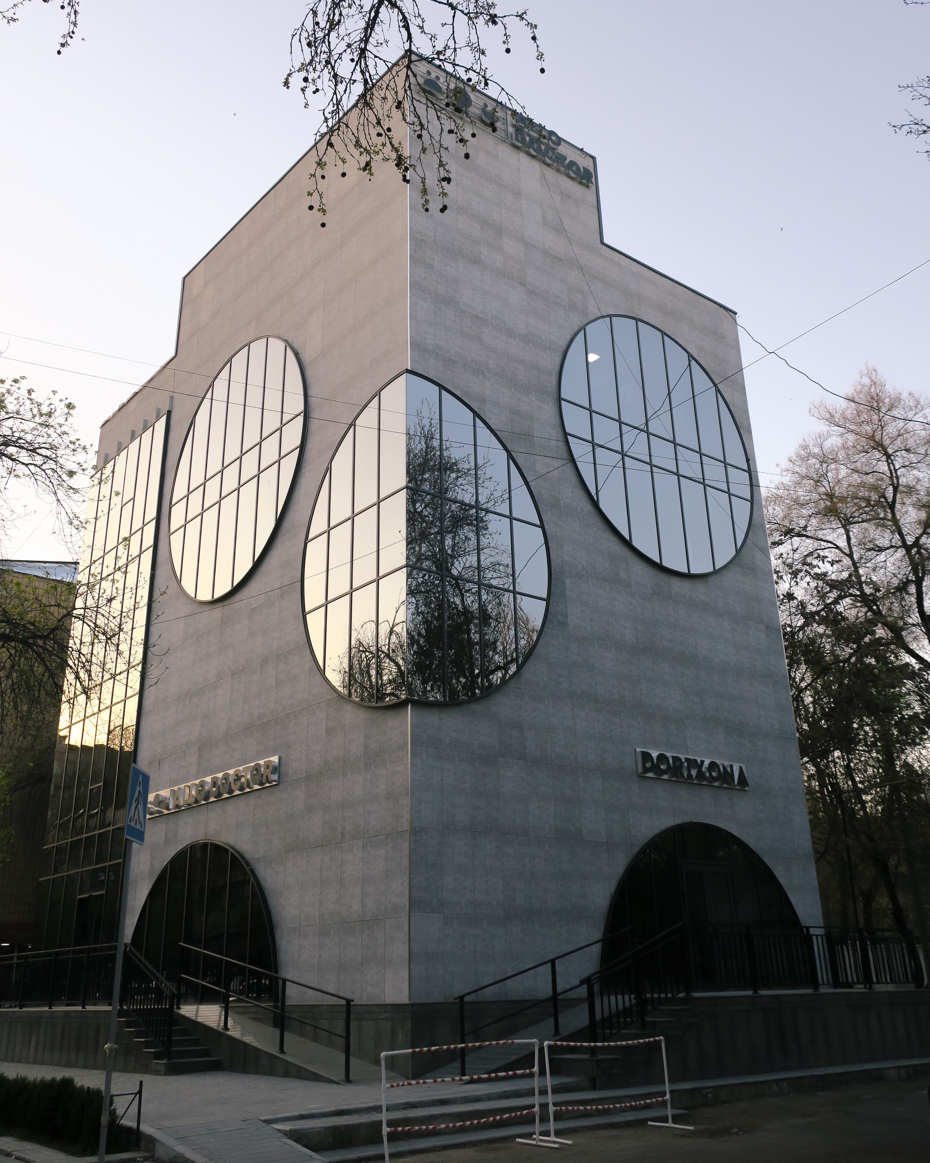 Modern Architecture Building with Unique Oval Windows · Free Stock Photo