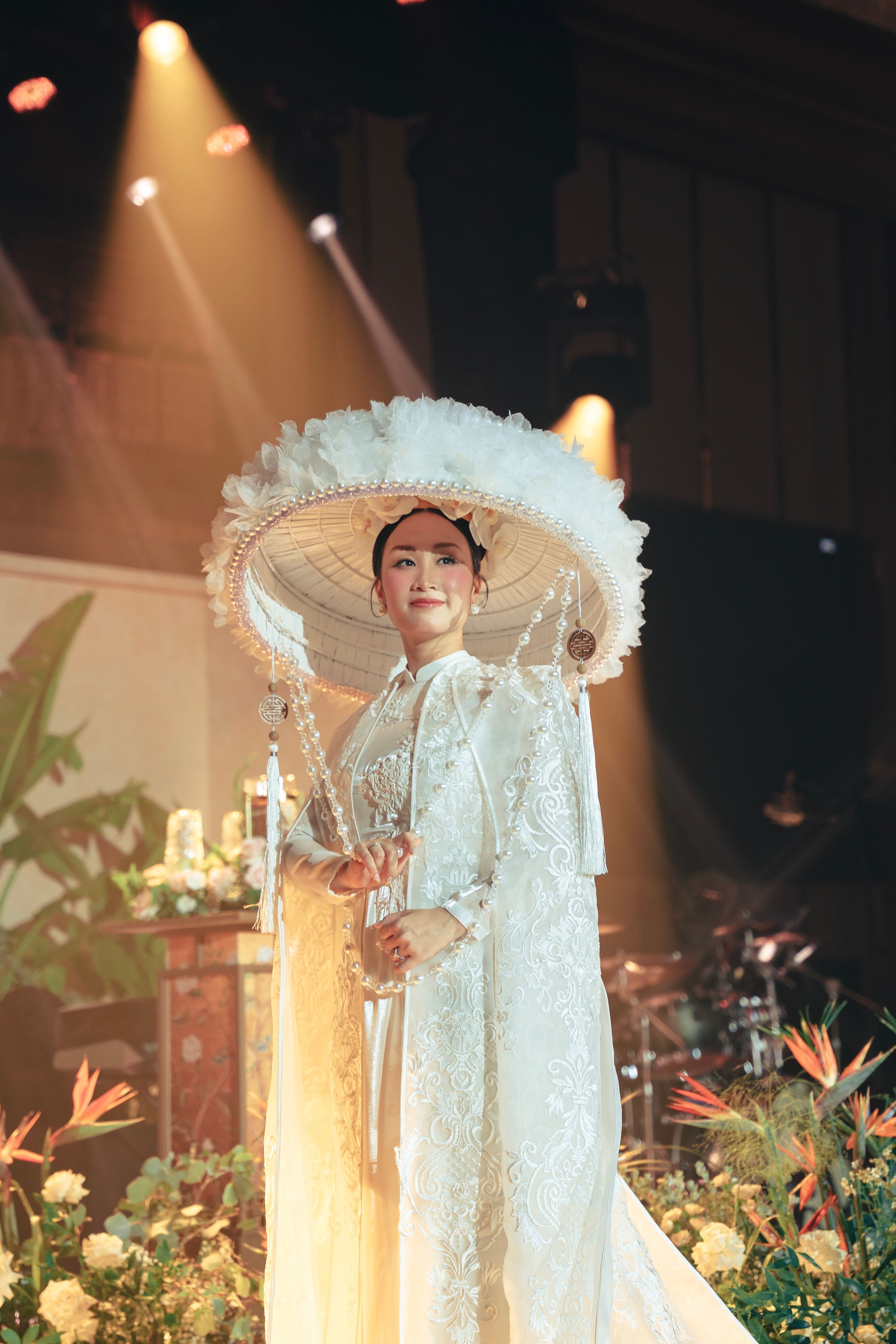 Elegant bride in traditional lace attire indoors · Free Stock Photo