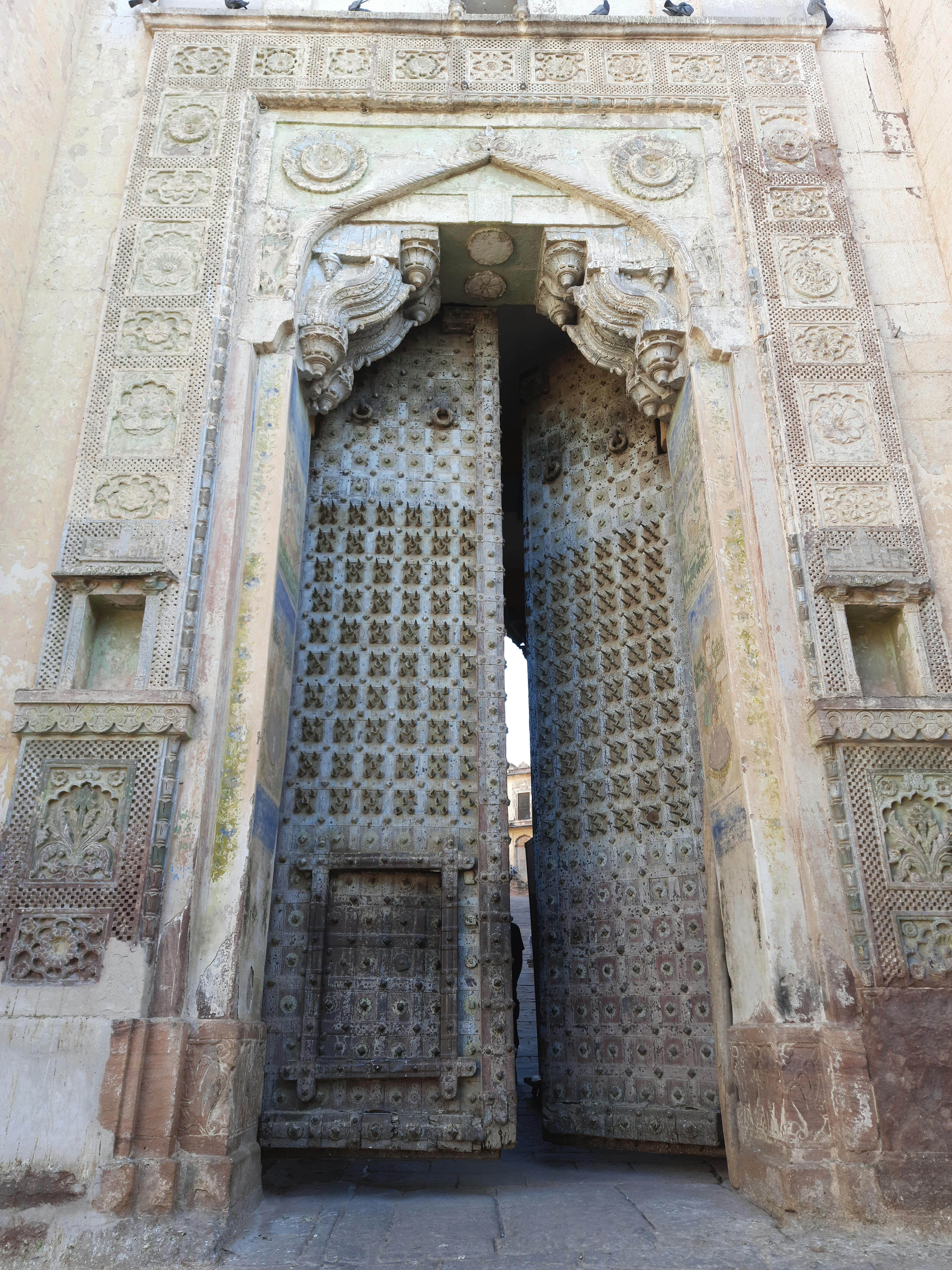 Ancient Ornate Gate with Intricate Carvings · Free Stock Photo