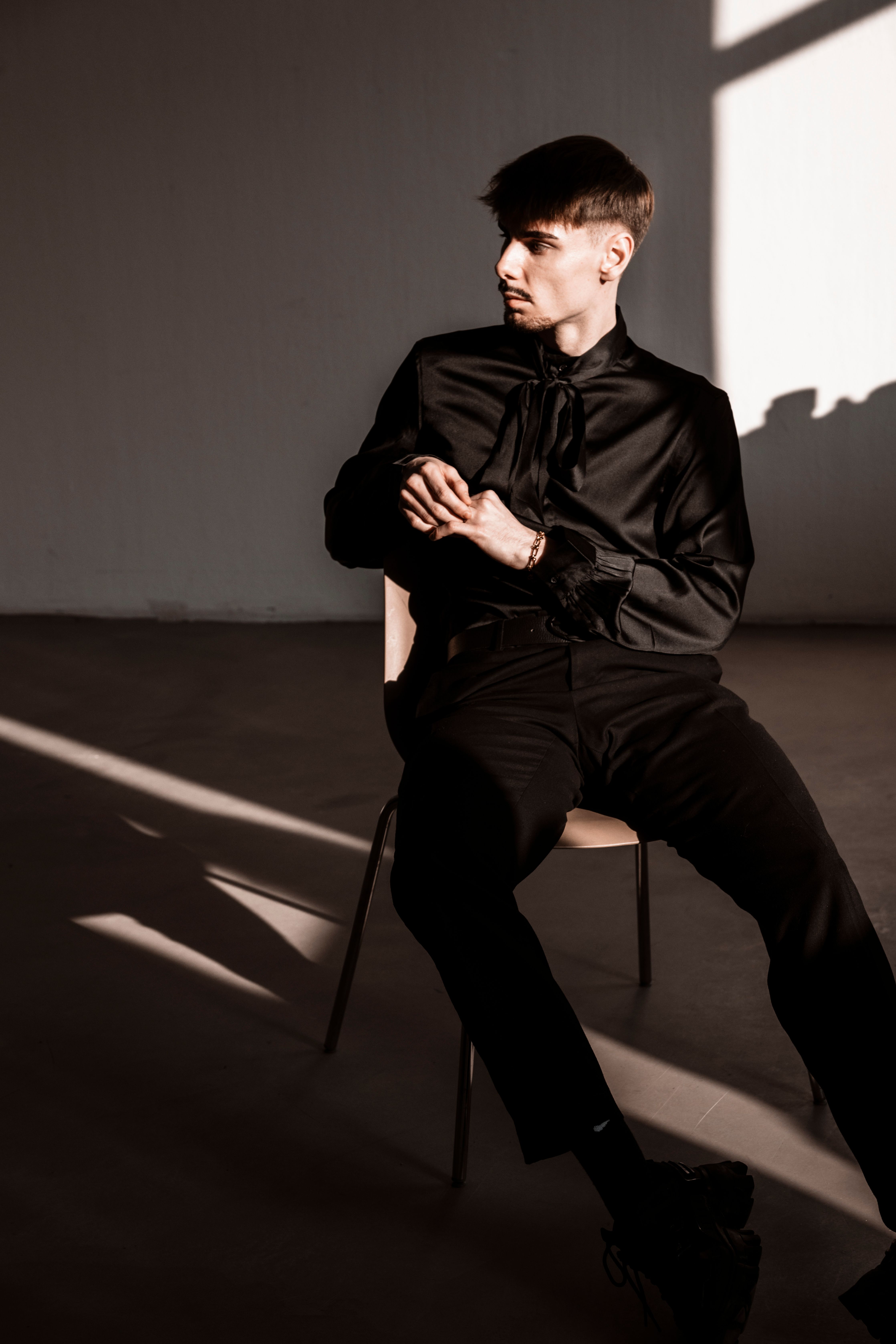 Stylish Male Portrait in Dramatic Lighting · Free Stock Photo