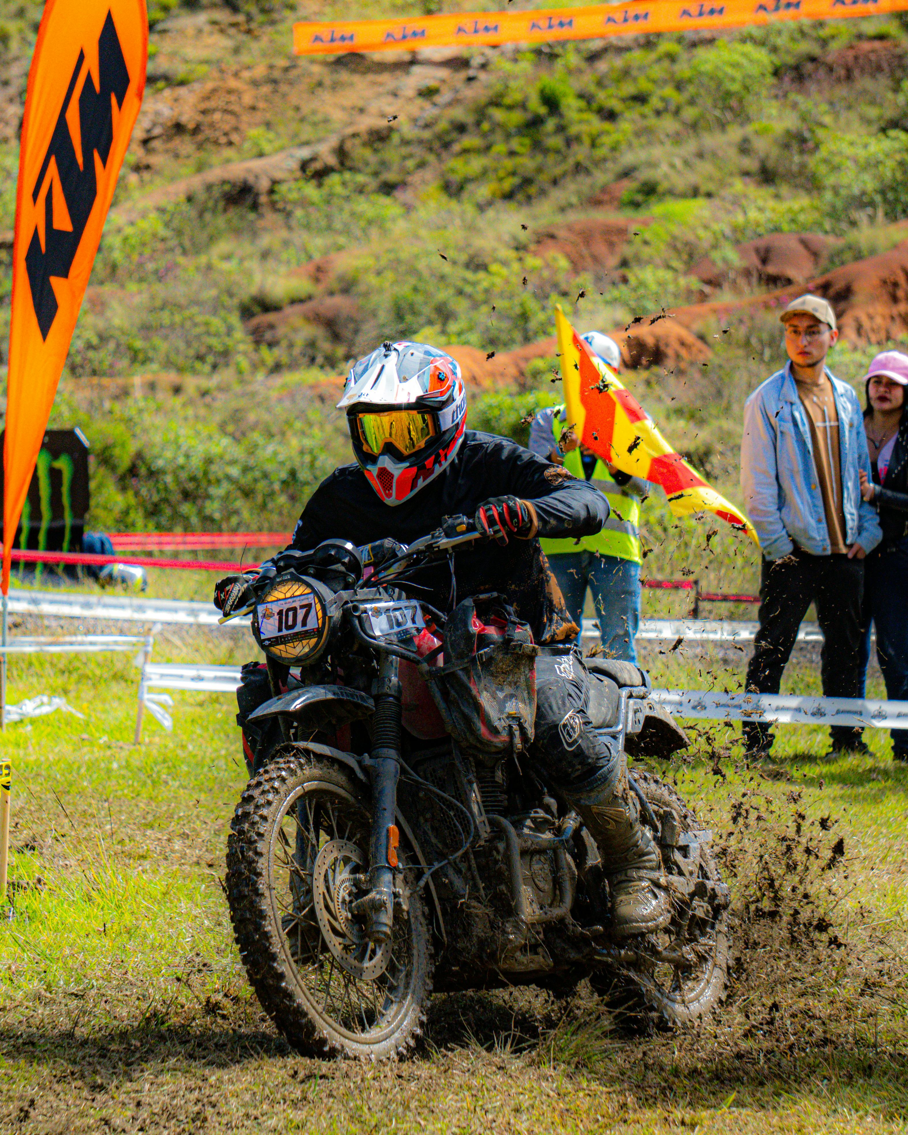 Exciting Off-Road Motorcycle Race Action Shot · Free Stock Photo