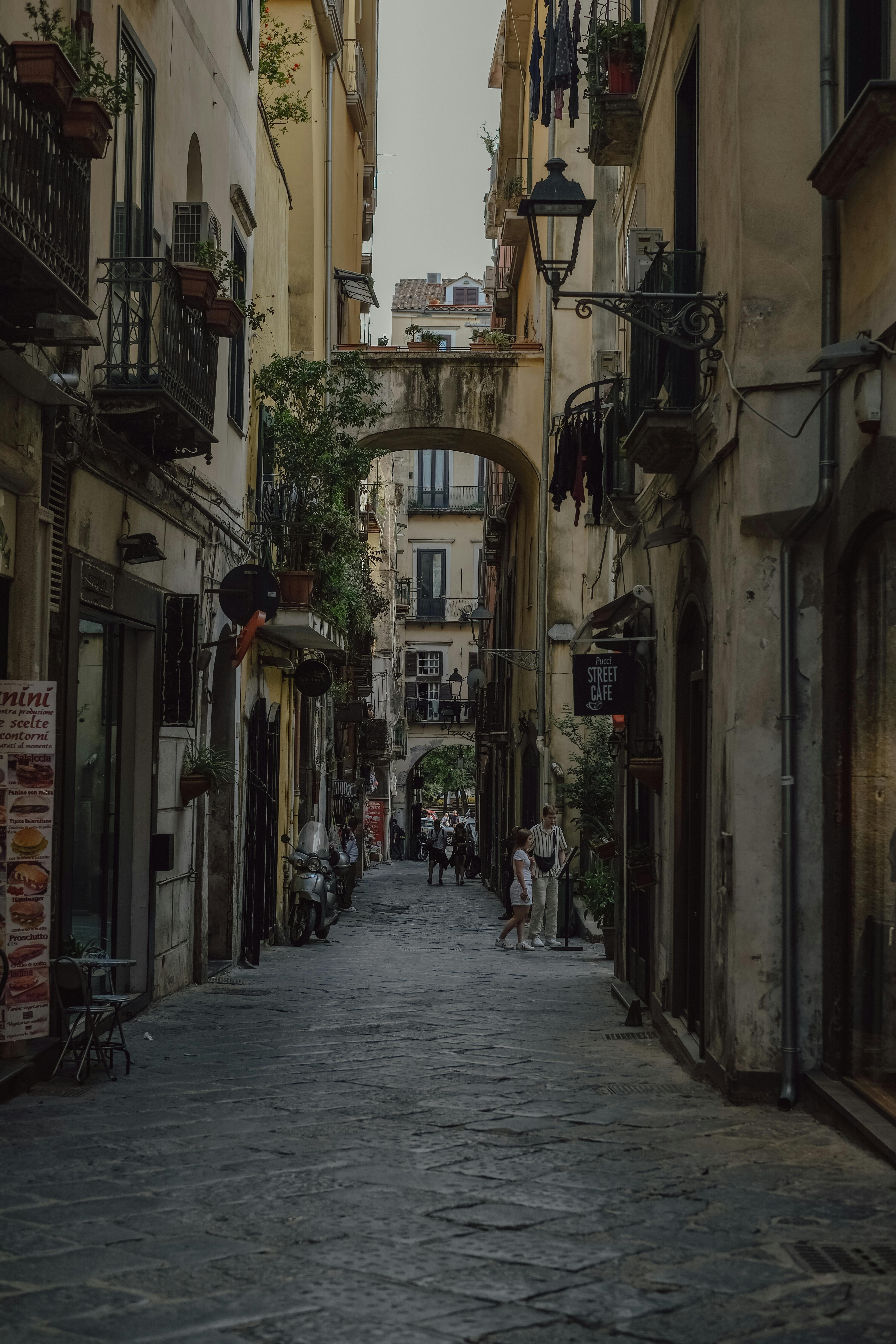Charming Narrow Alleyway in Historic European City · Free Stock Photo