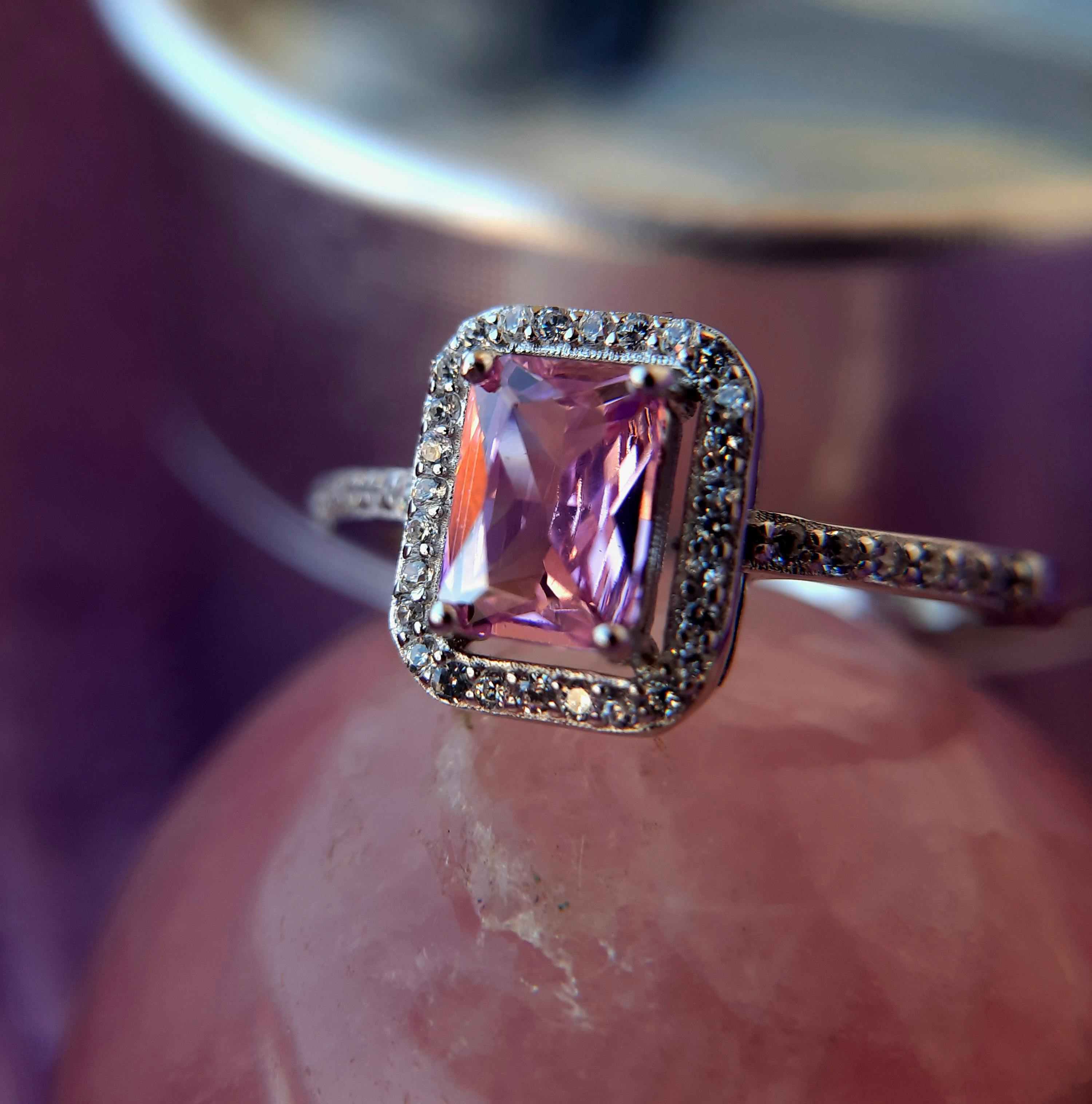 Elegant Silver Ring with Pink Gemstone Close-Up · Free Stock Photo