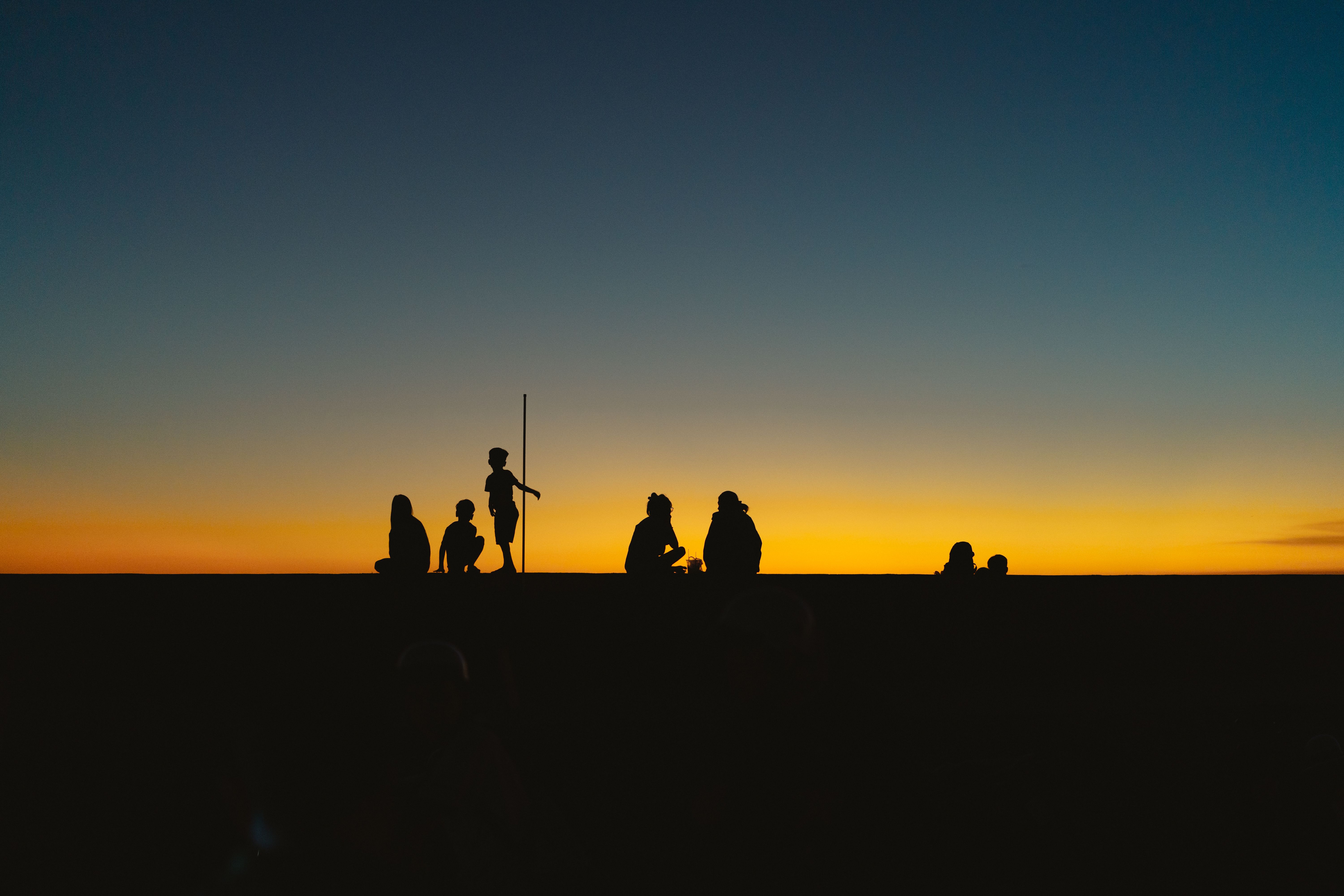 Silhouetted Group Enjoying Sunset in Vietnam · Free Stock Photo