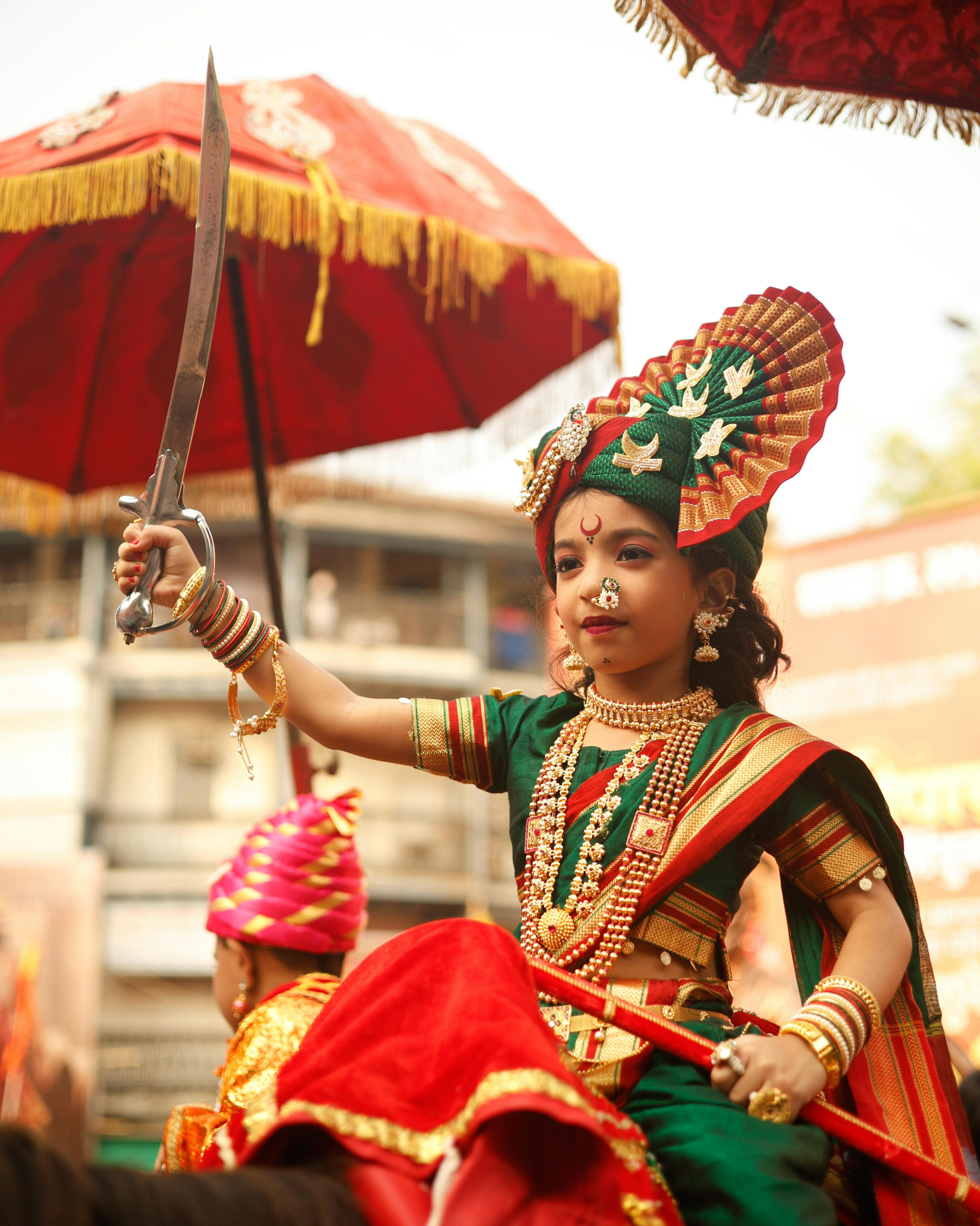Colorful Cultural Parade with Child in Traditional Attire · Free Stock ...