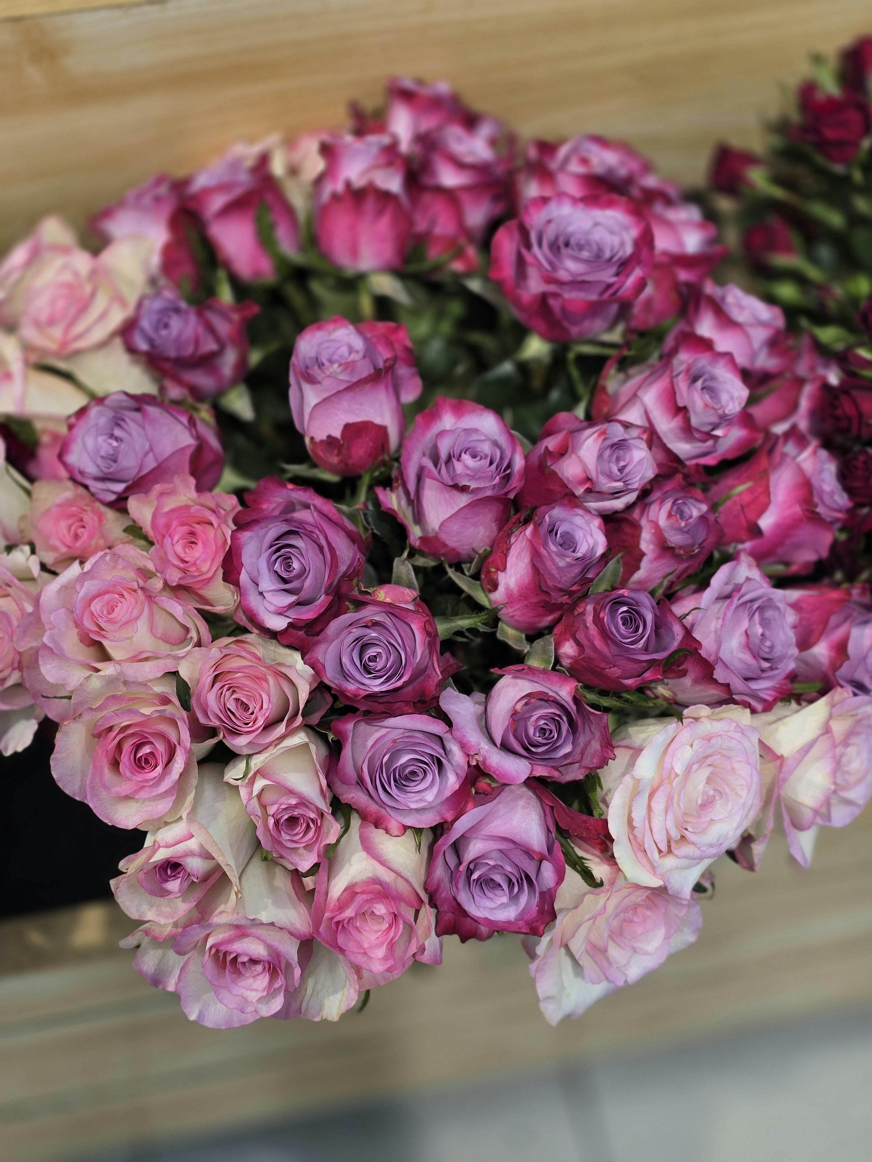 Vibrant Pink and Purple Rose Bouquet · Free Stock Photo