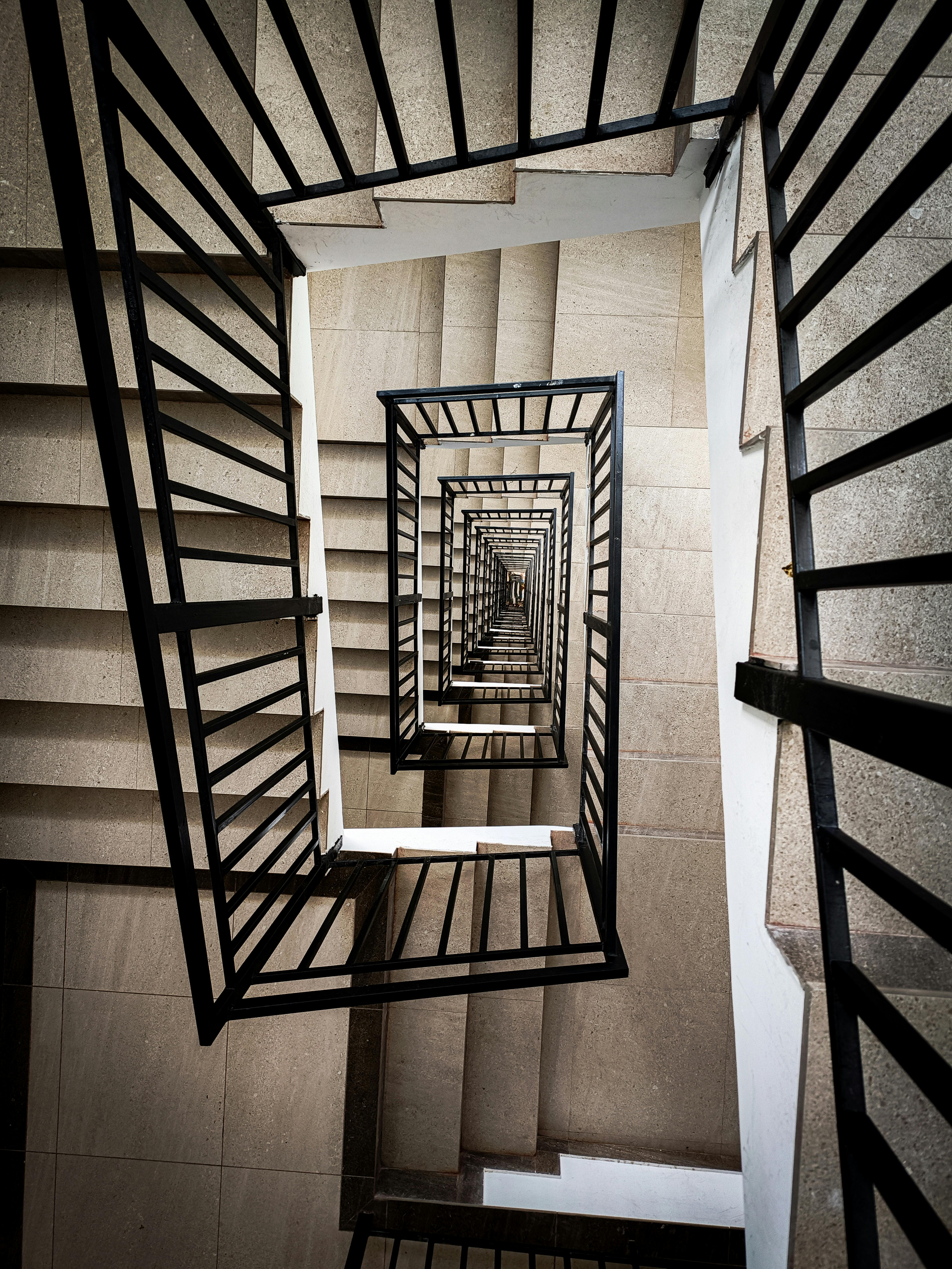 Spiral Staircase Vertical Perspective in Modern Building · Free Stock Photo