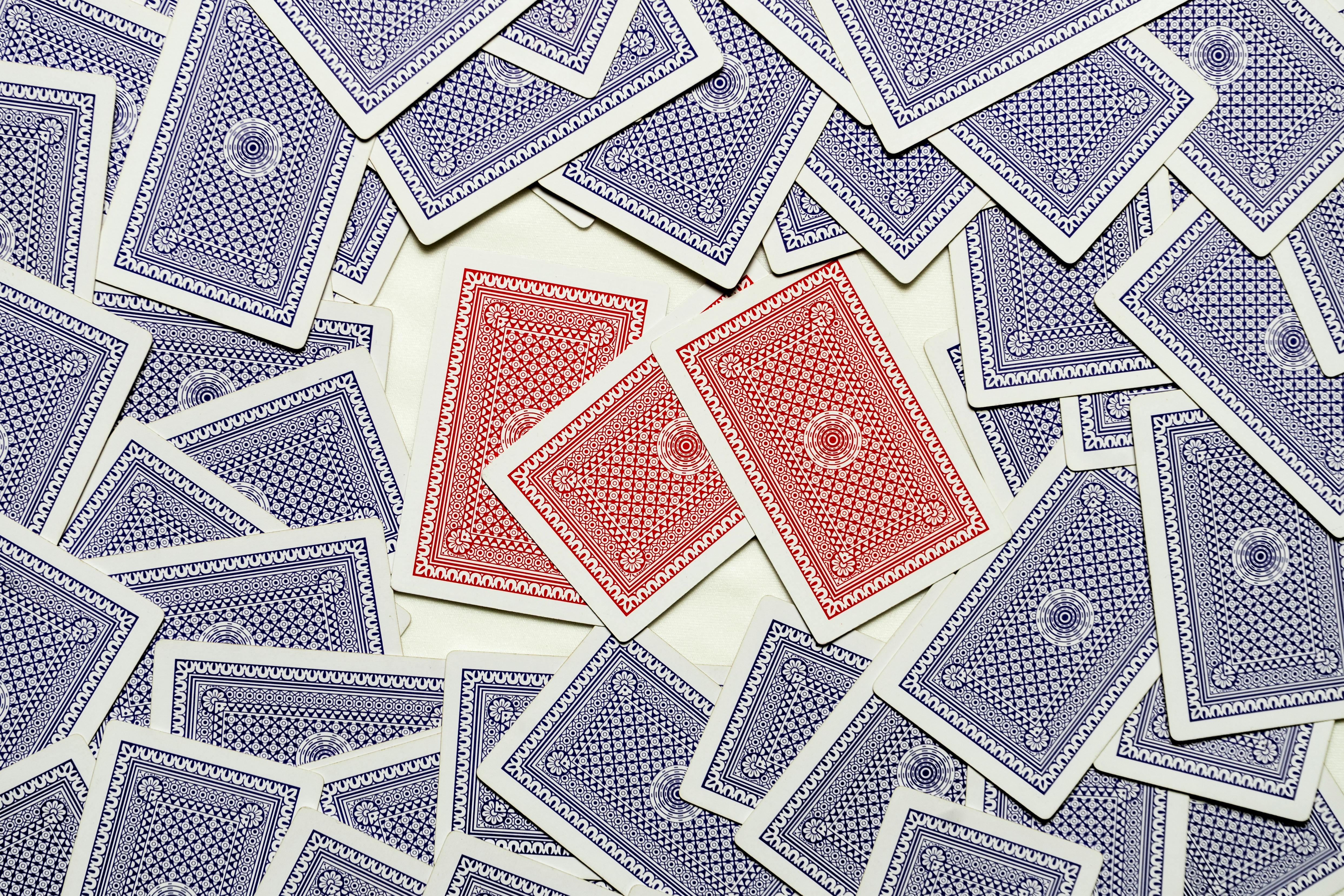 Overlay of Red and Blue Playing Cards · Free Stock Photo