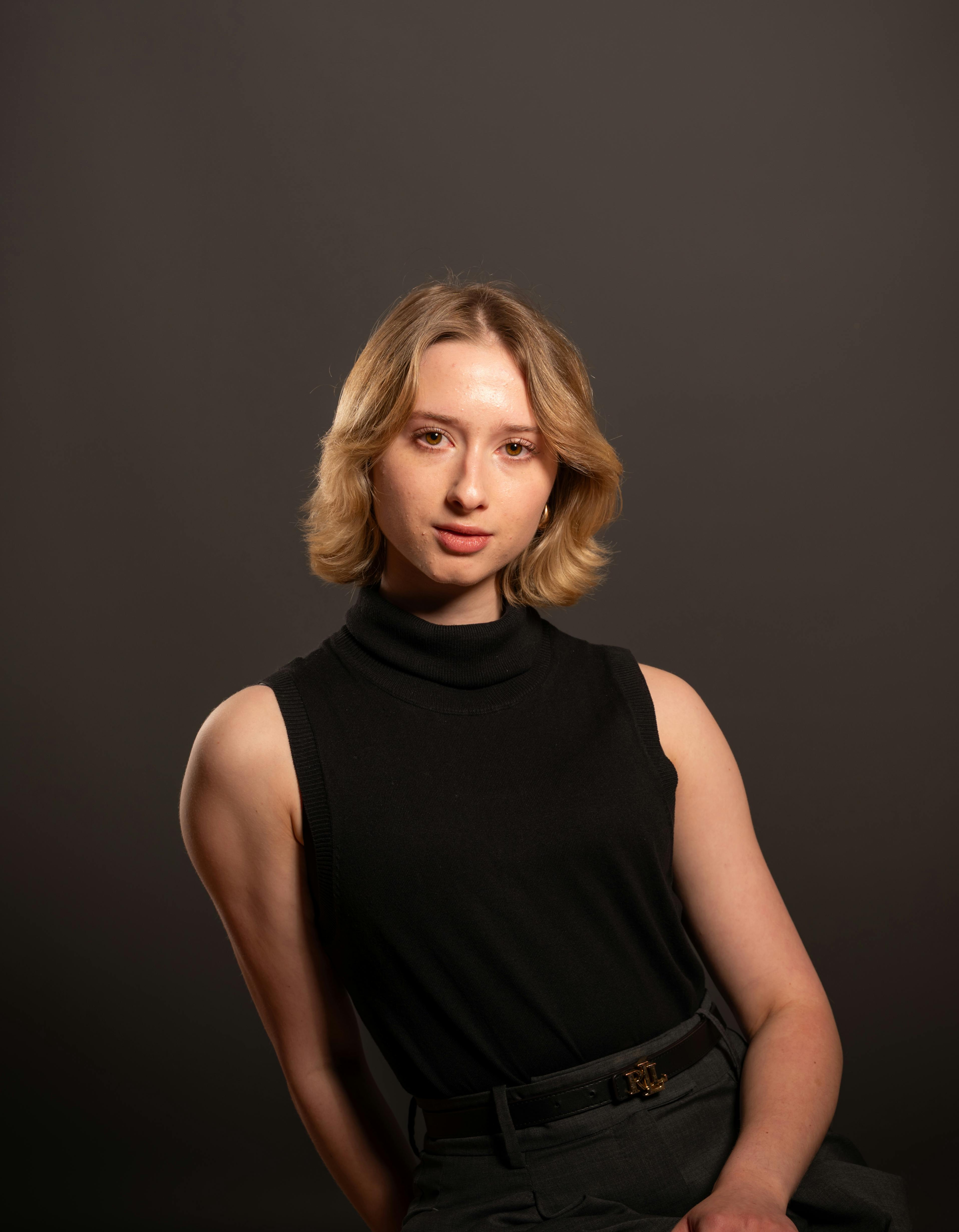 Professional Female Portrait with Dramatic Lighting · Free Stock Photo