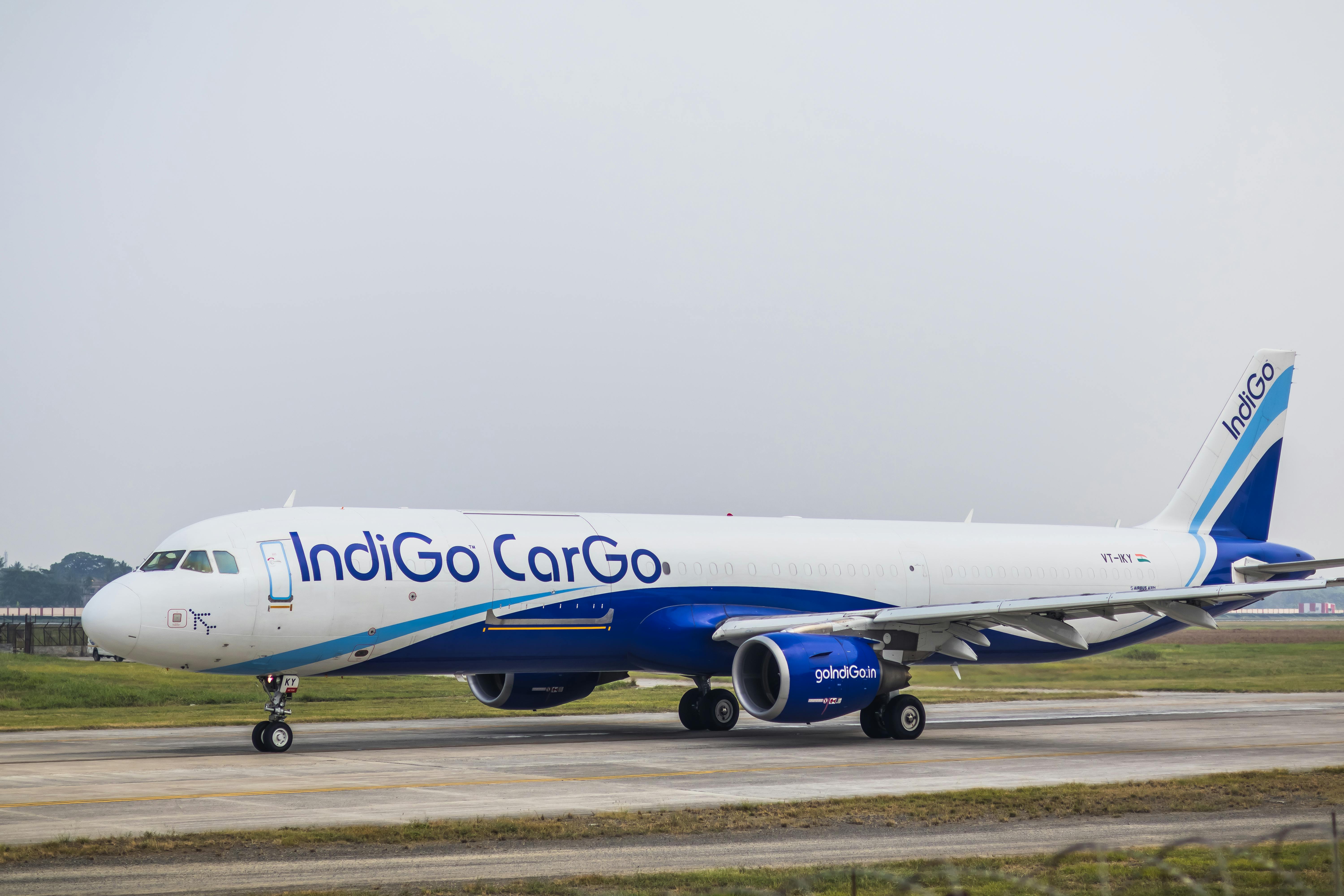IndiGo Cargo Airplane on Runway in Daylight · Free Stock Photo