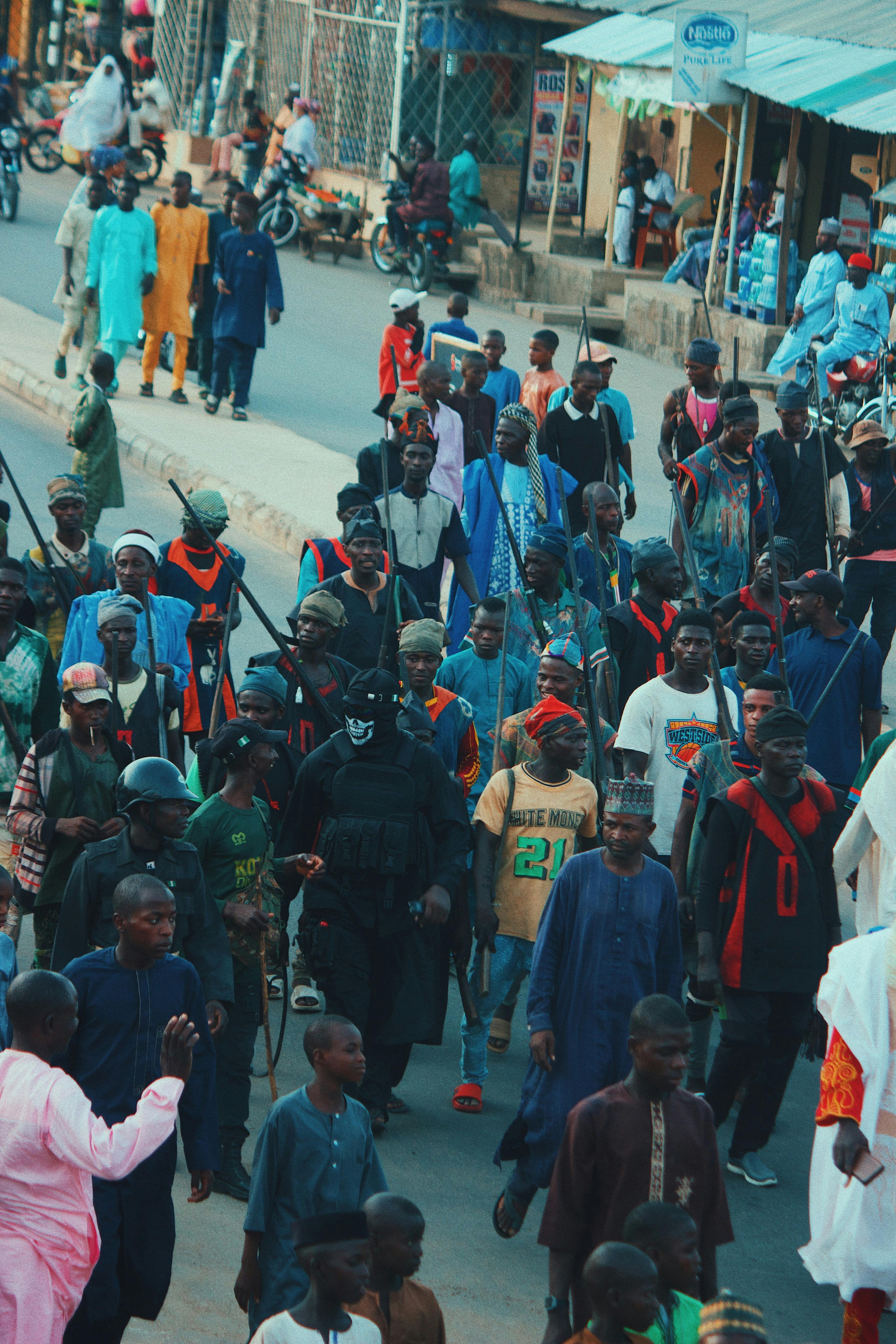 Vibrant Crowd in Nigerian Street Gathering · Free Stock Photo