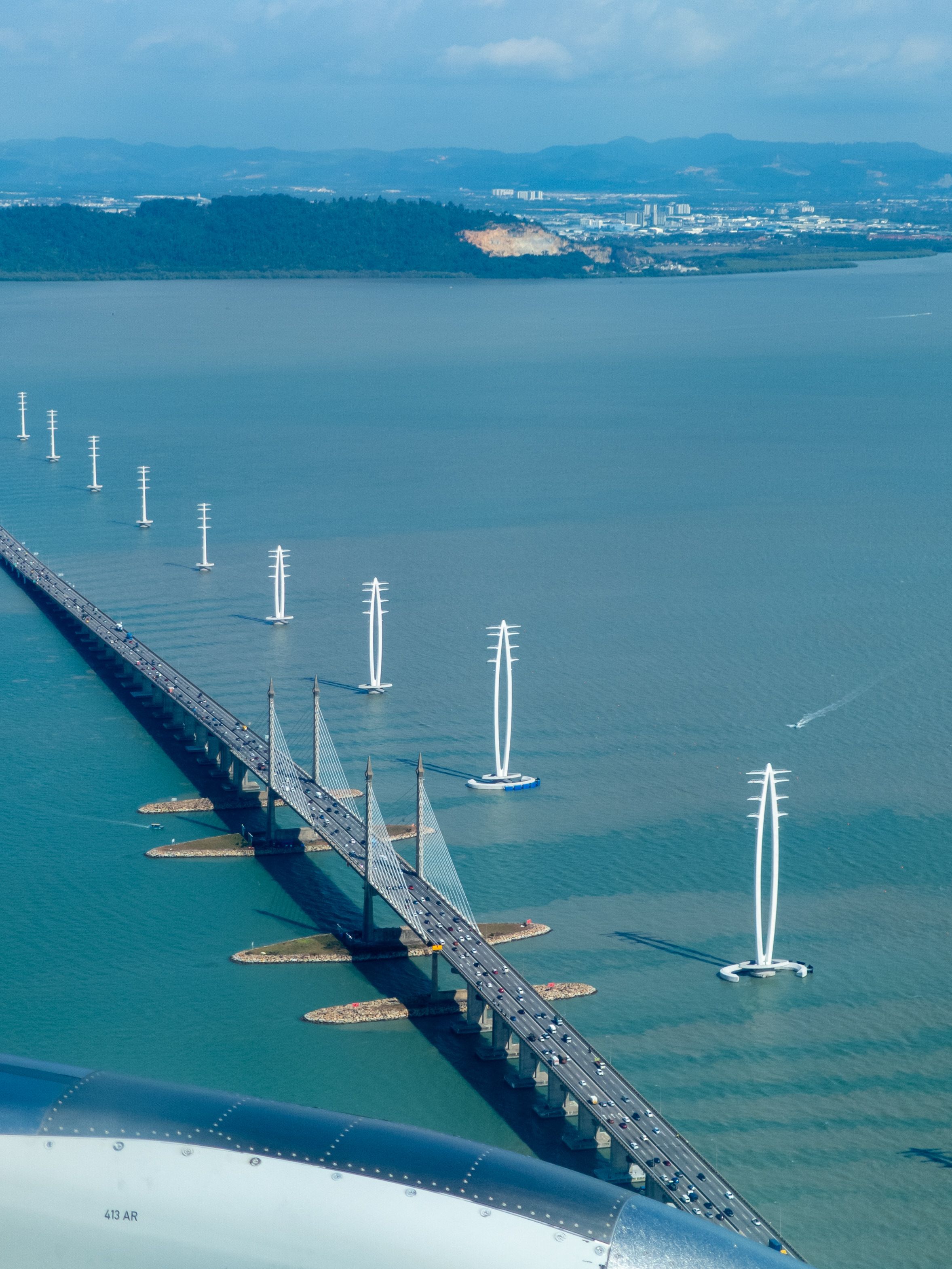 Aerial View of Penang Bridge Spanning Blue Sea · Free Stock Photo