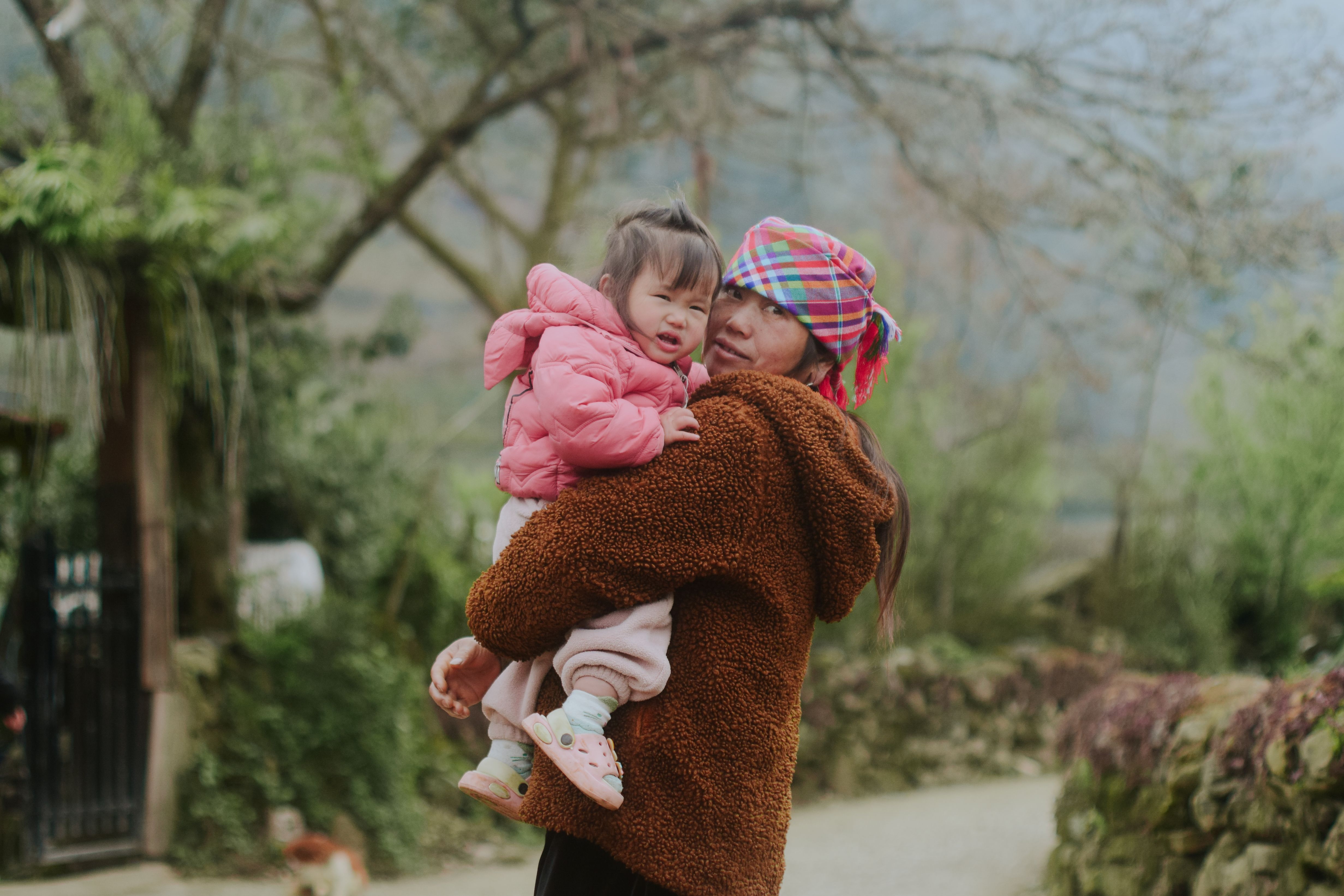 Mother and Child in Scenic Countryside · Free Stock Photo