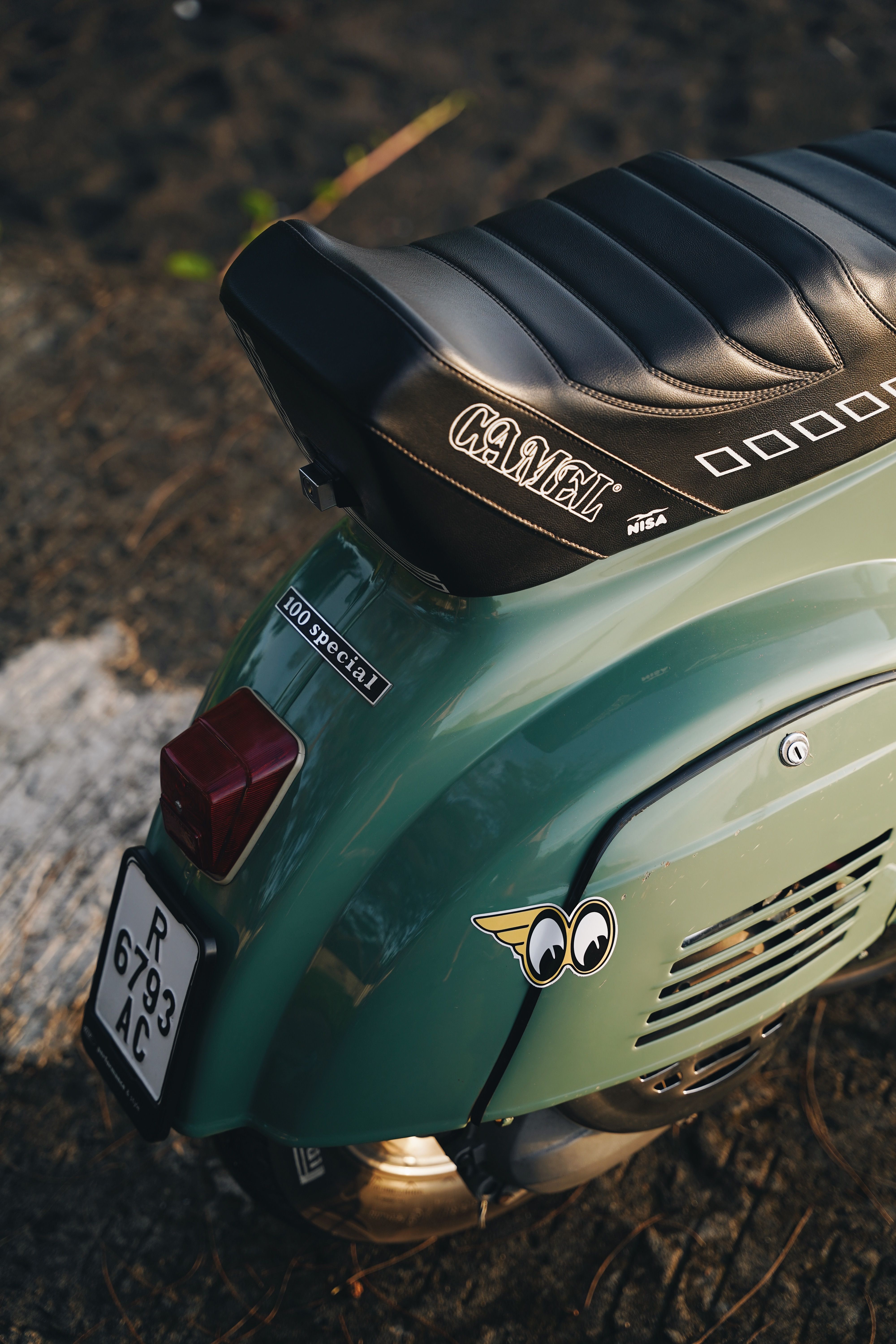 Vintage Green Scooter with Artistic Details · Free Stock Photo