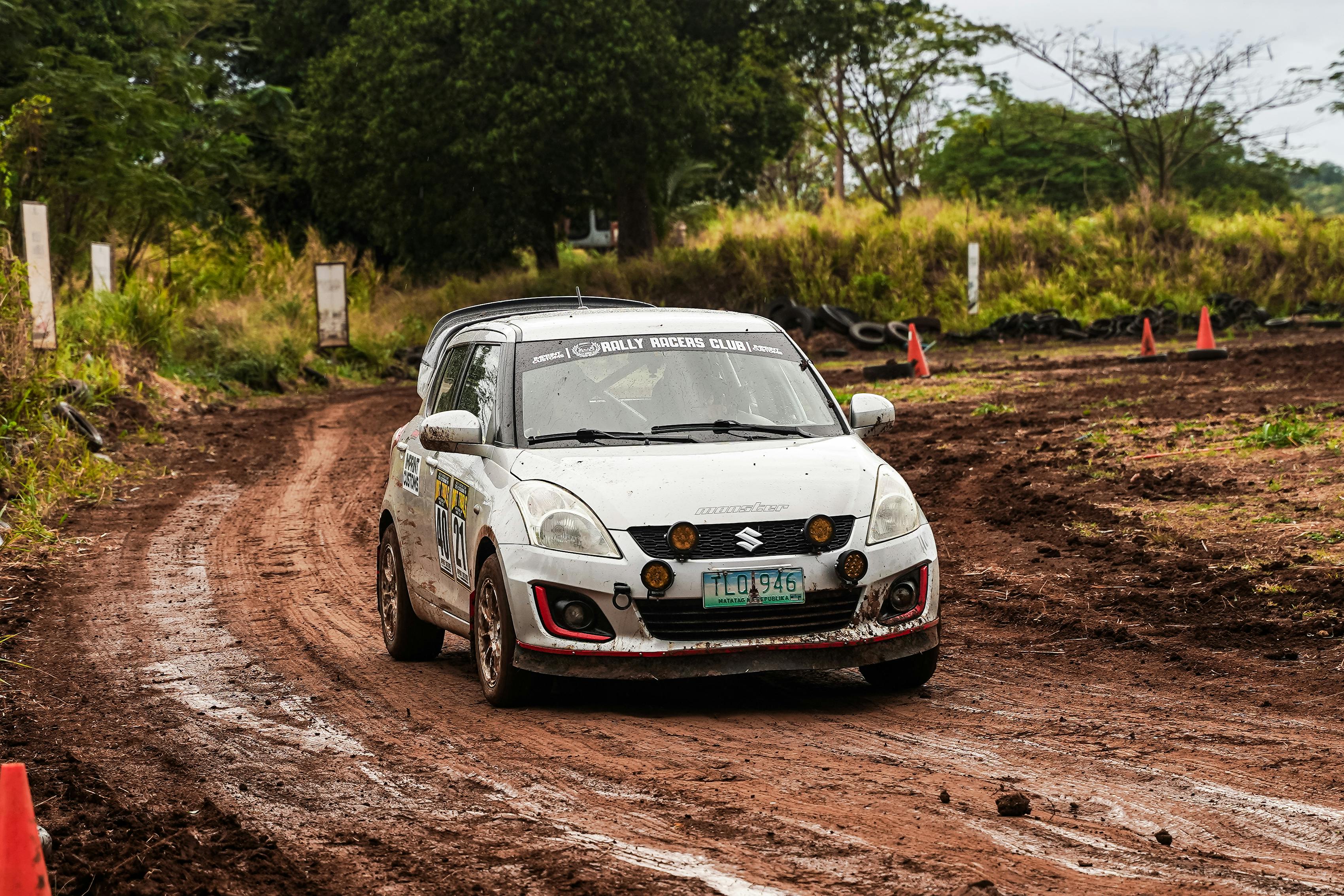 Rally Car Racing on a Muddy Track in Baras · Free Stock Photo