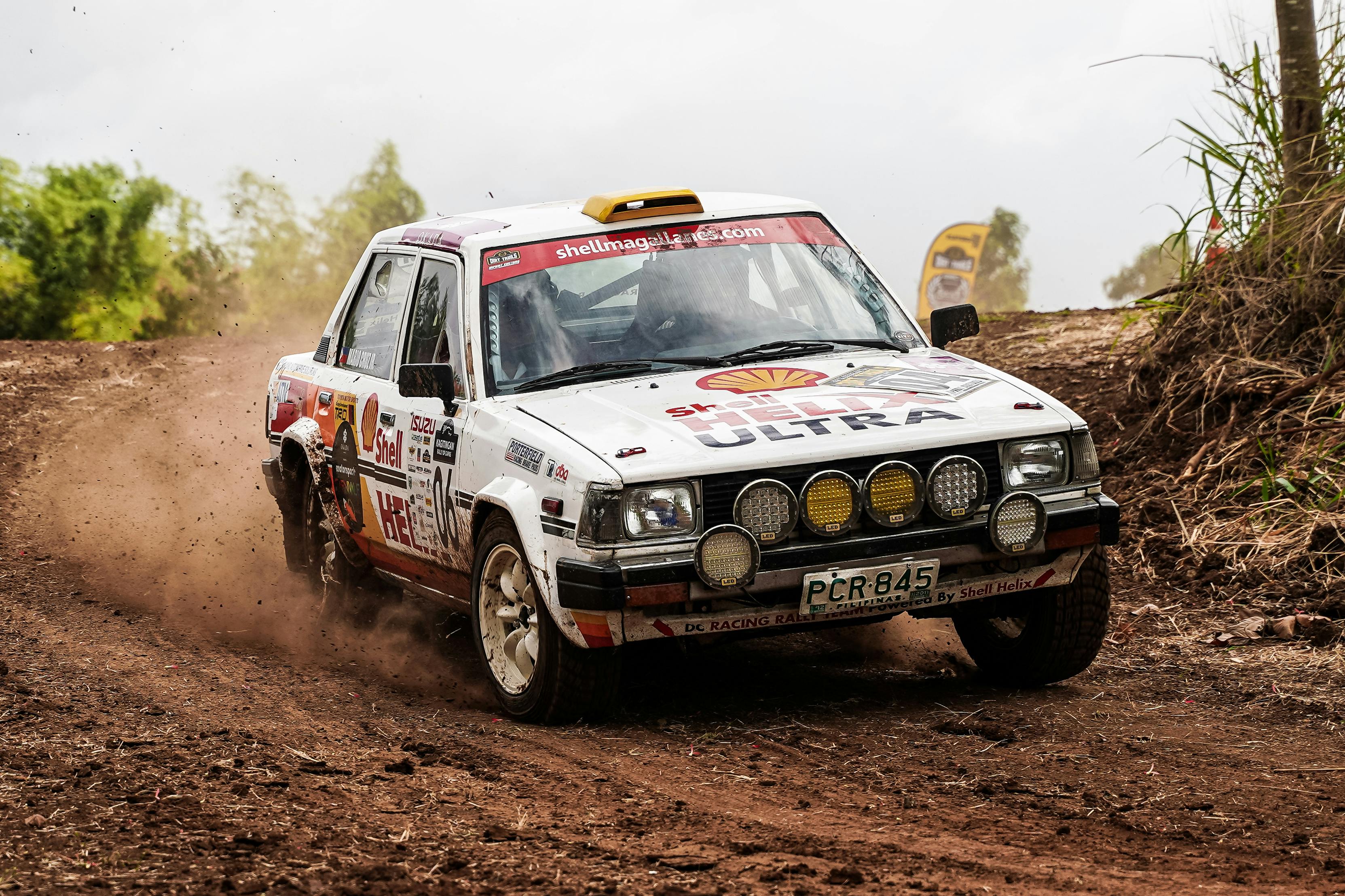 Exciting Rally Car Action on Dirt Track · Free Stock Photo