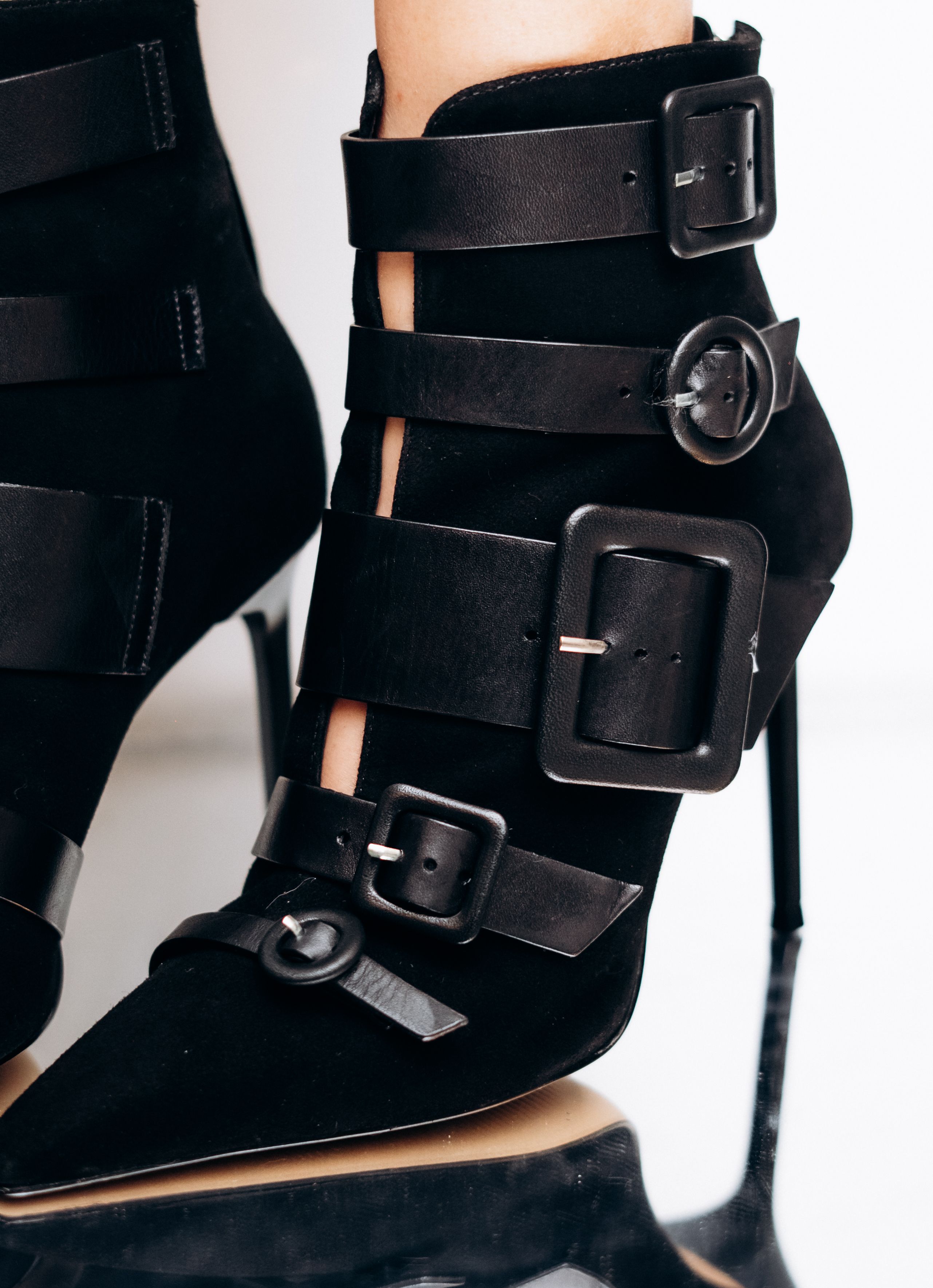 Elegant Black Stiletto Ankle Boots with Straps · Free Stock Photo