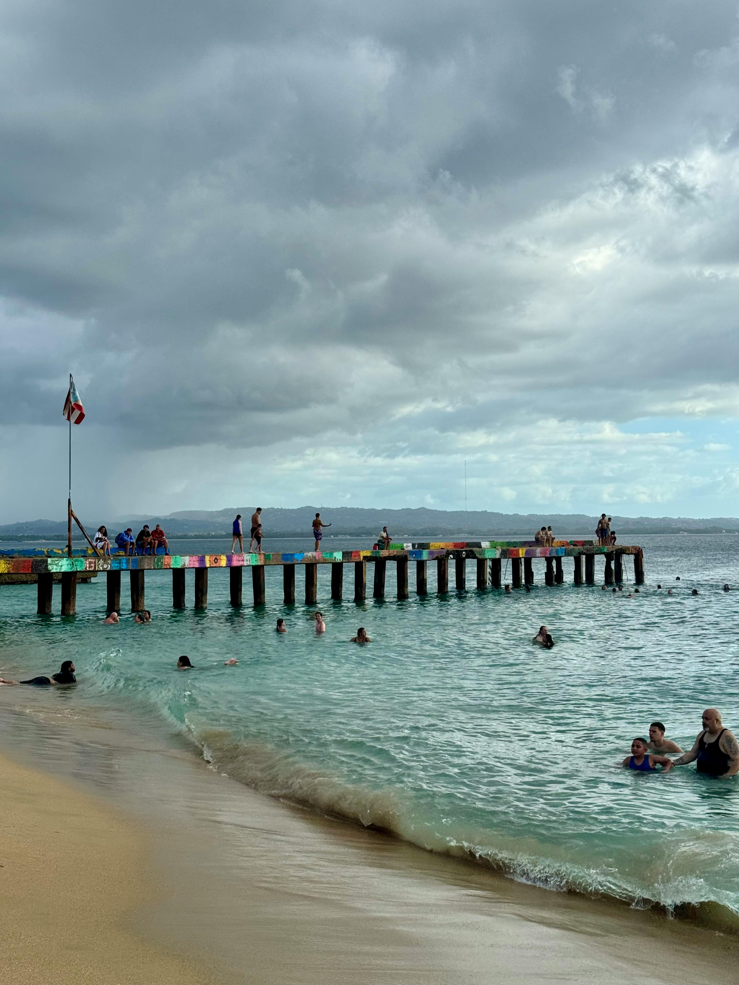 Serene Beach Day at Colorful Pier, Puerto Rico · Free Stock Photo