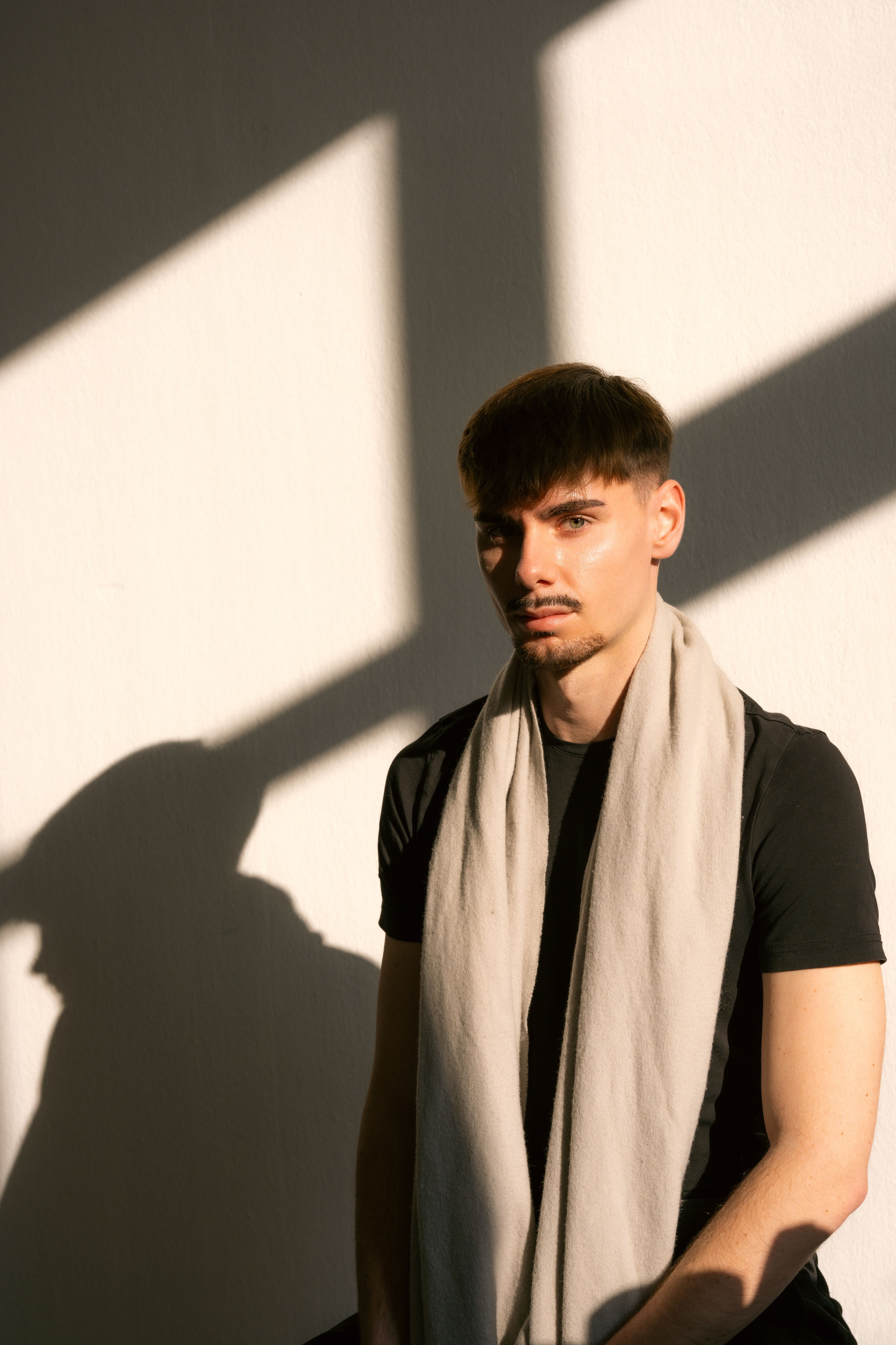 Stylish Portrait of a Man in Dramatic Lighting · Free Stock Photo