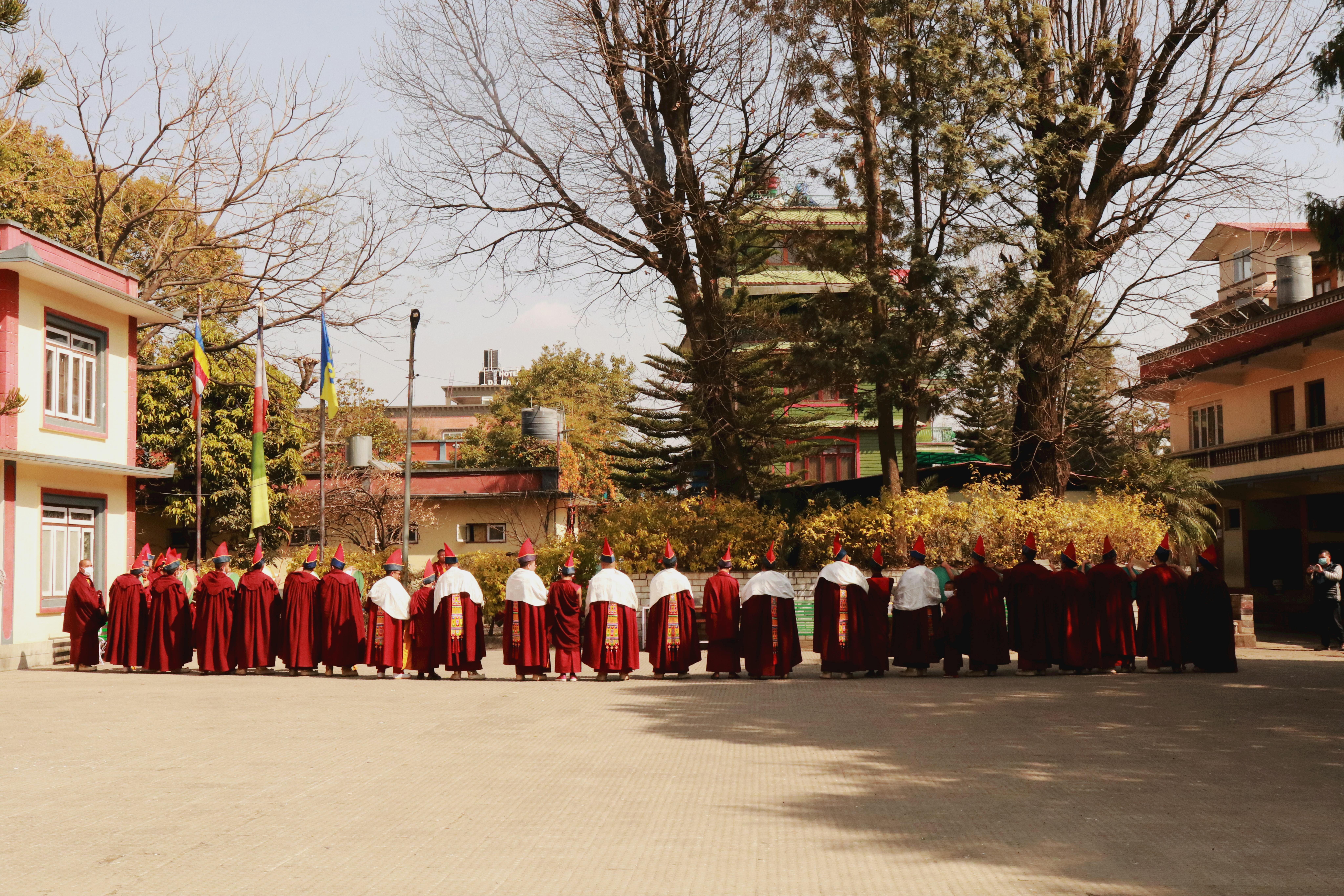 Nepalese Monks in Traditional Attire at Monastery · Free Stock Photo