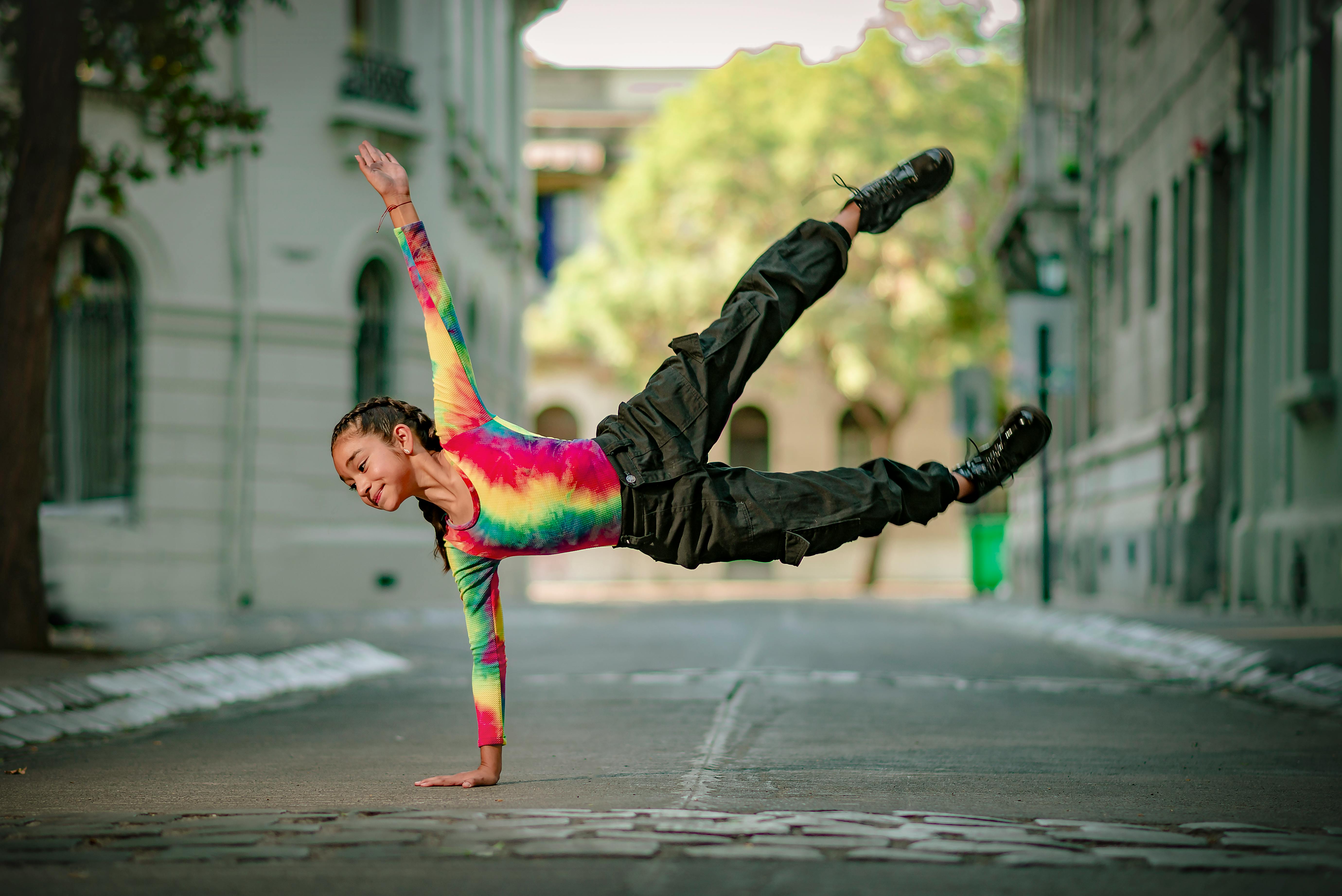 Street Dance Performance in Colorful Attire · Free Stock Photo