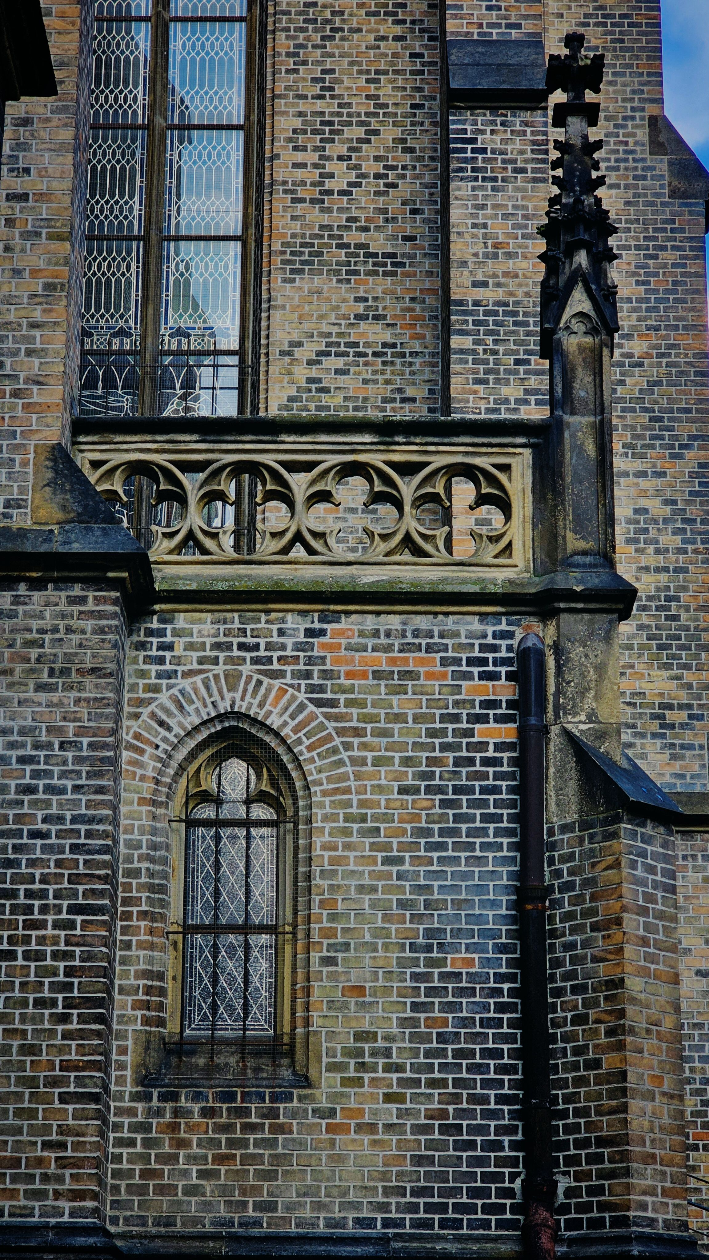 Gothic Church Wall with Arched Window · Free Stock Photo