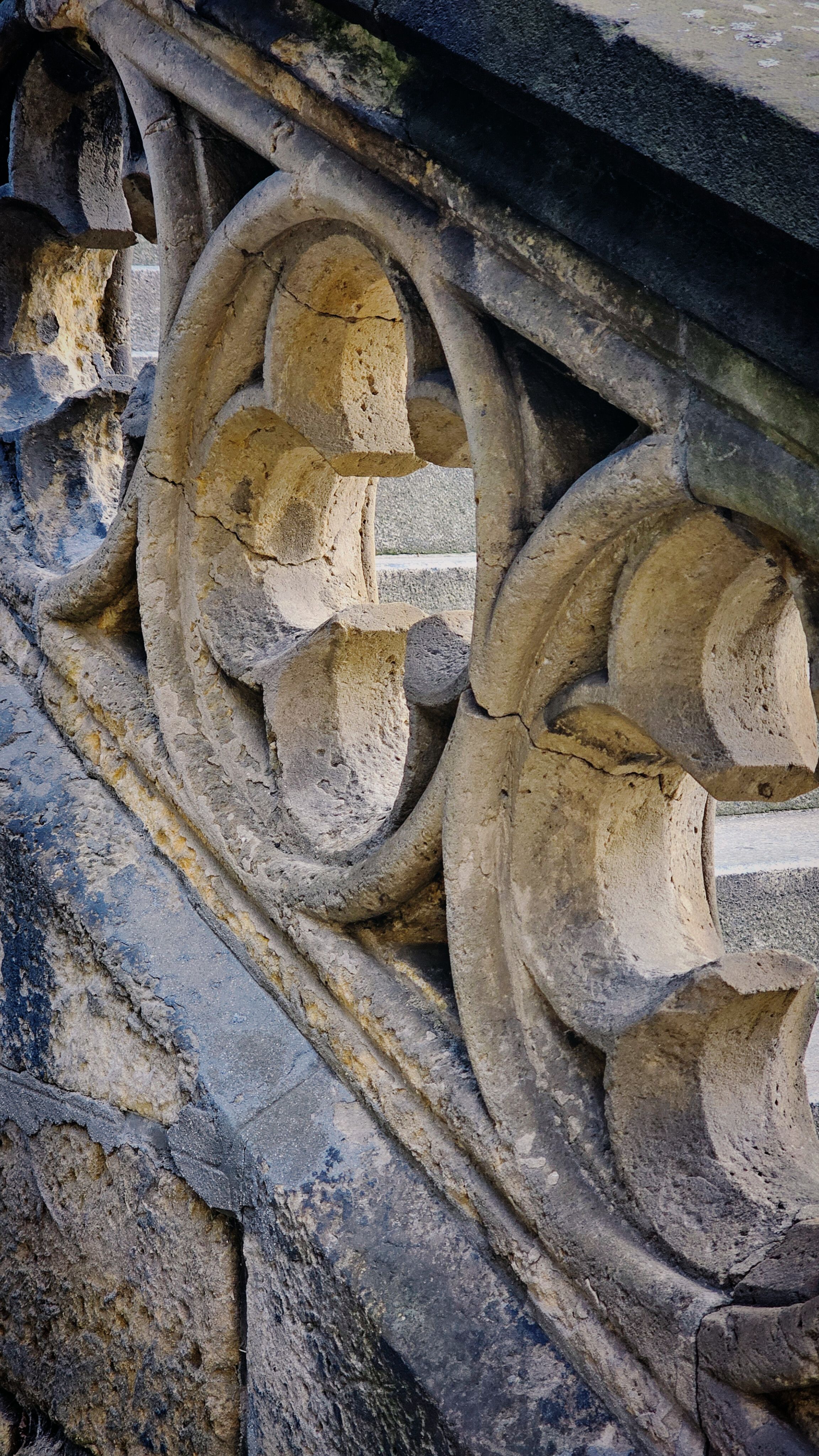 Intricate Stone Carving Detail on Historical Structure · Free Stock Photo
