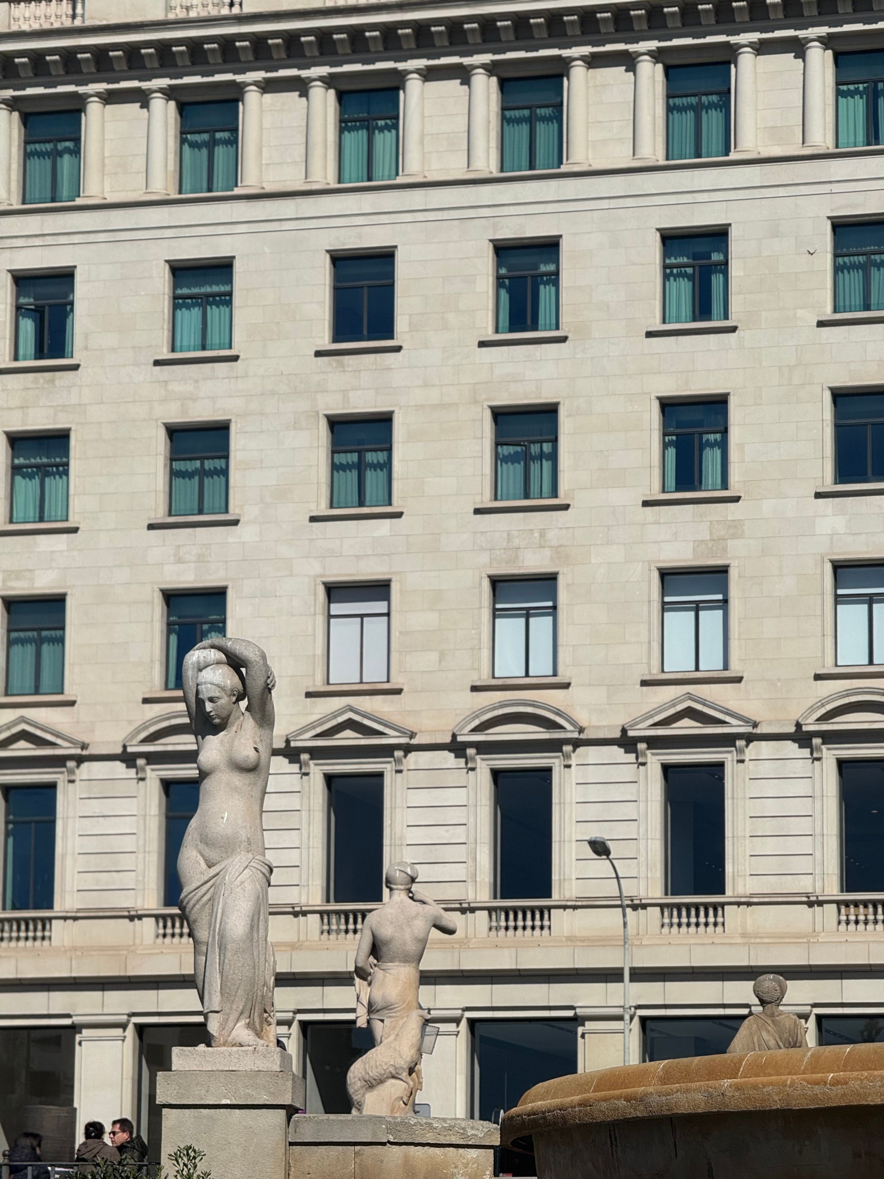 Classical Statues in Urban Setting with Historic Architecture · Free ...