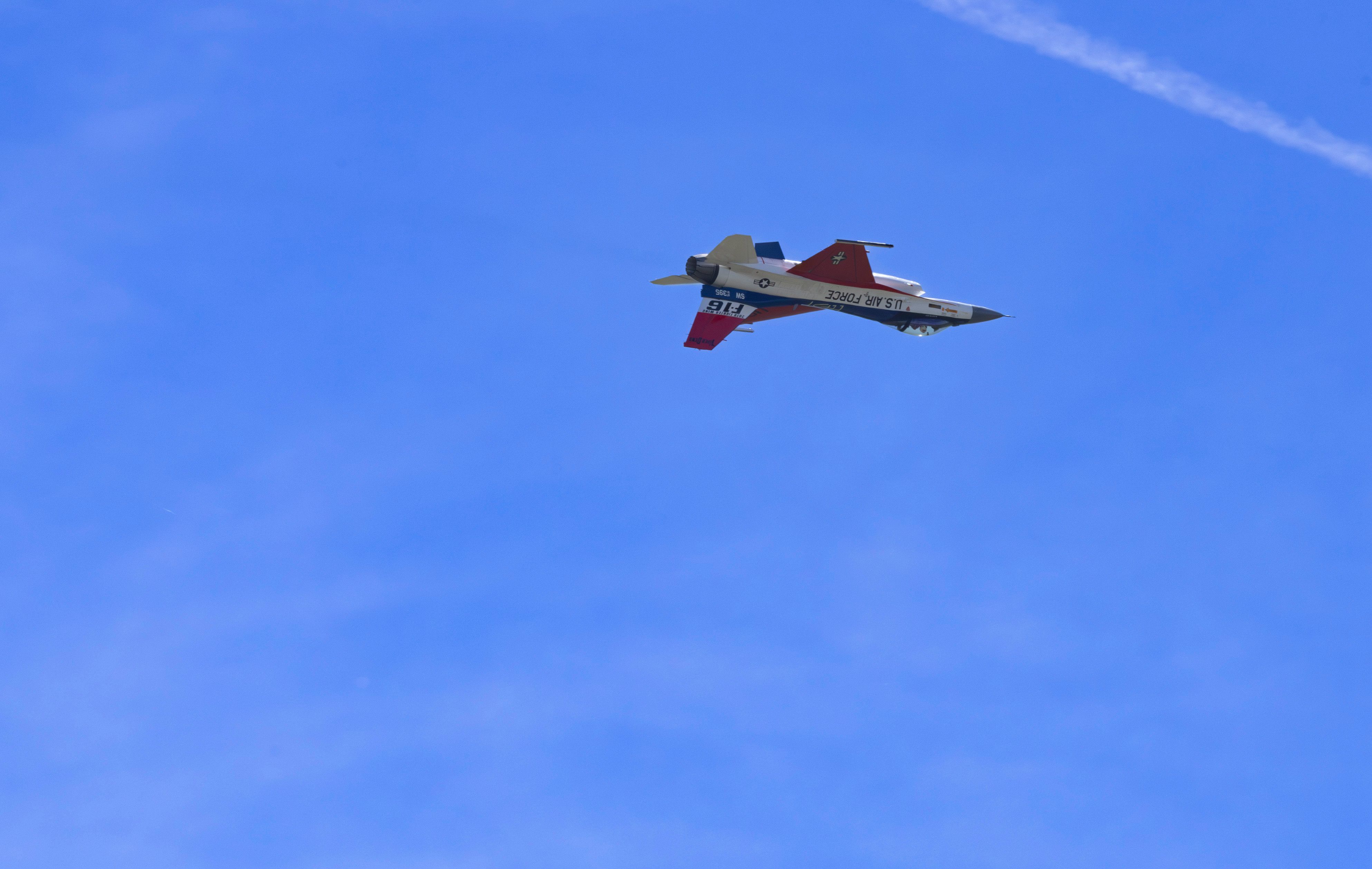 Jet Aircraft Flying in Clear Blue Sky · Free Stock Photo