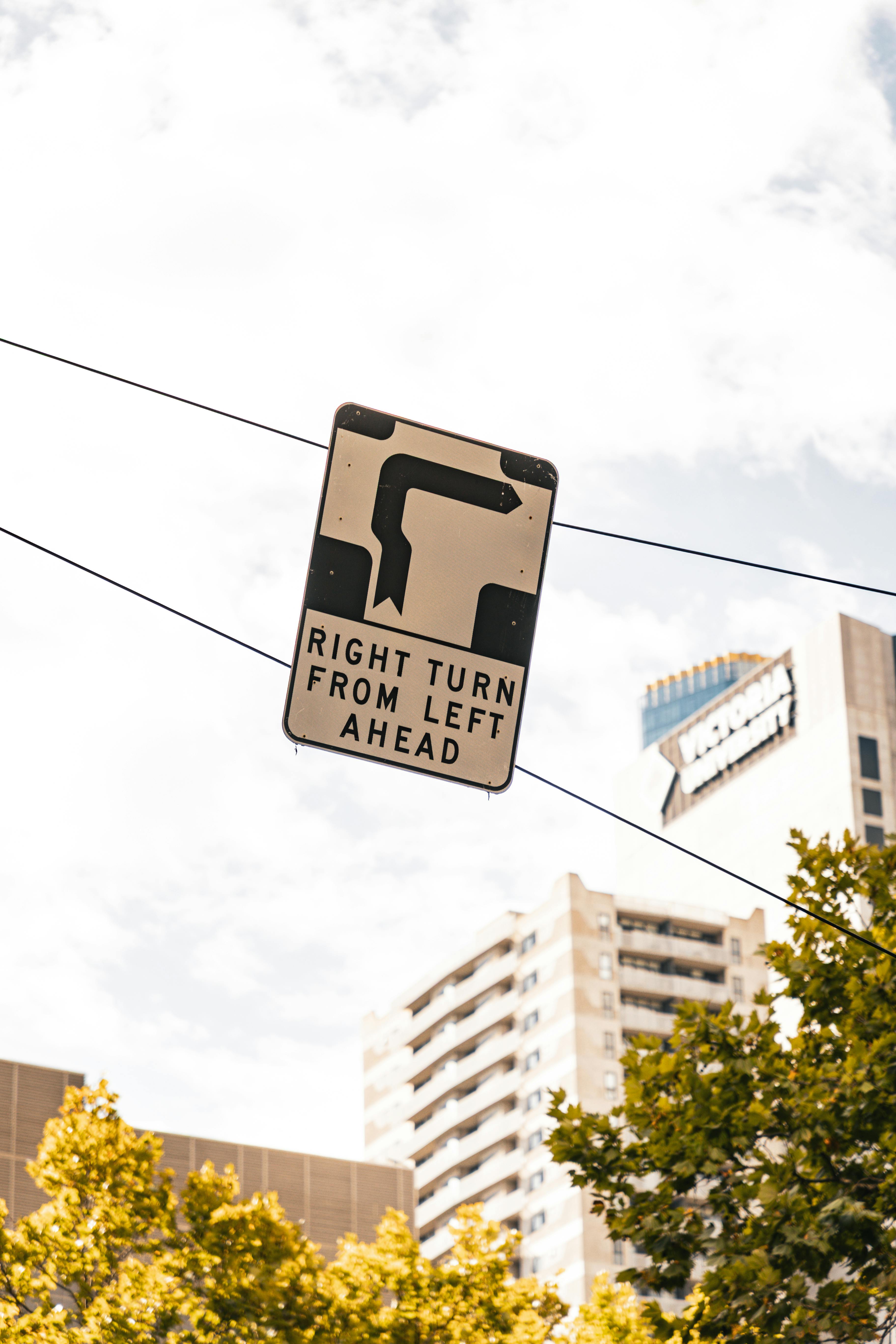 Melbourne Urban Street Sign with Skyscrapers · Free Stock Photo